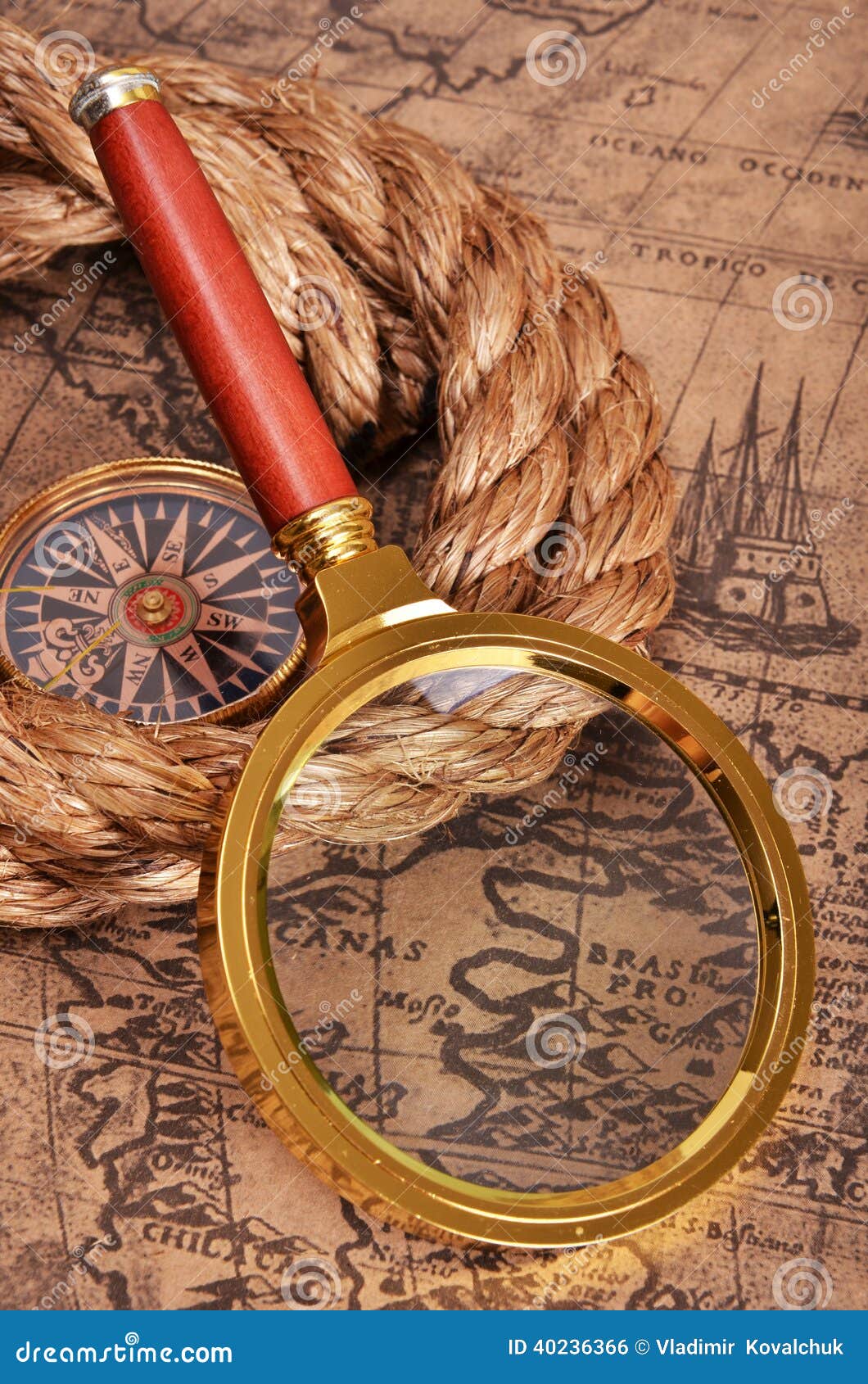 Magnifying Glass and Compass on the Ancient Map Stock Photo - Image of ...