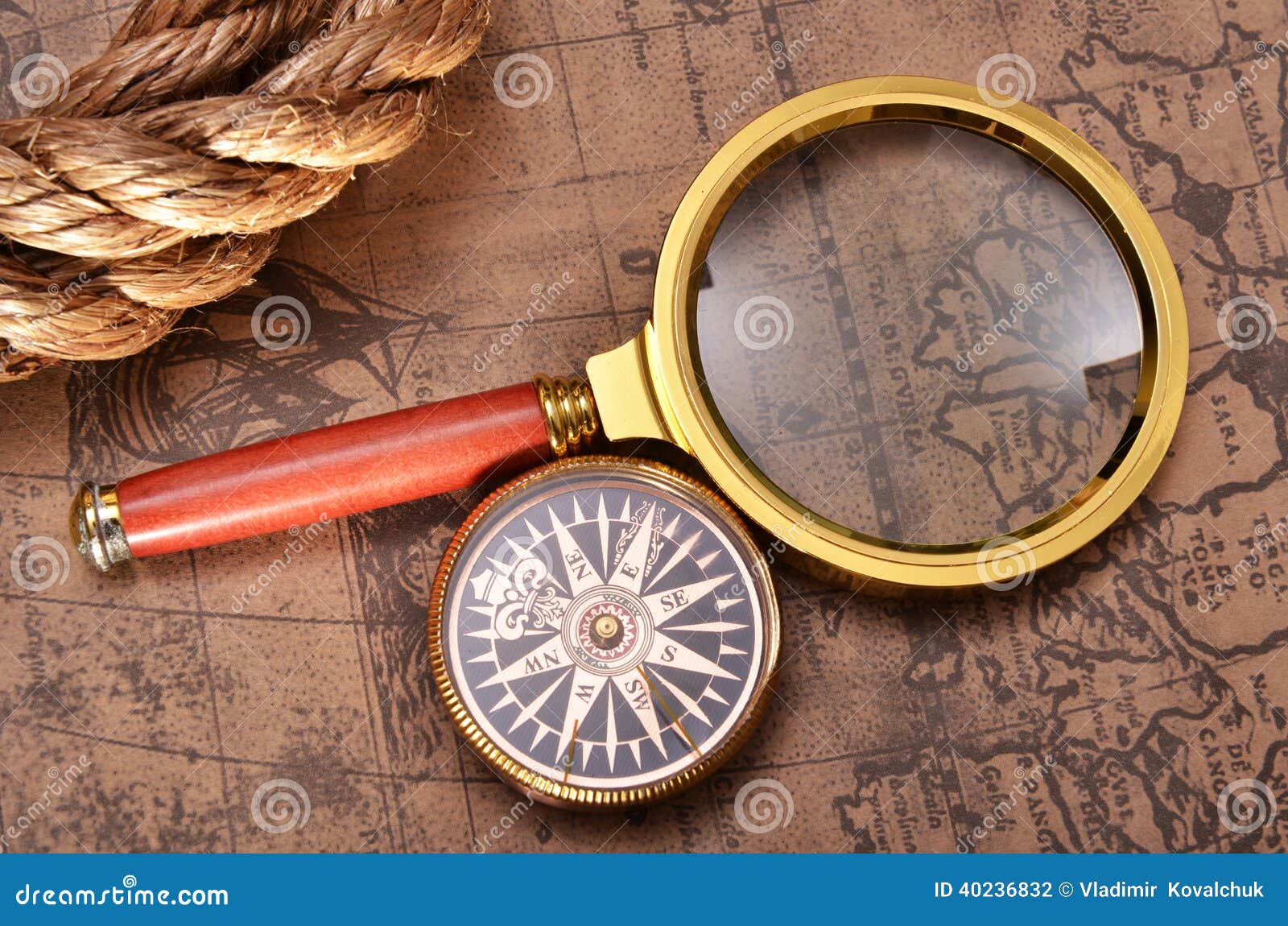 Magnifying Glass and Compass on the Ancient Map Stock Photo - Image of ...