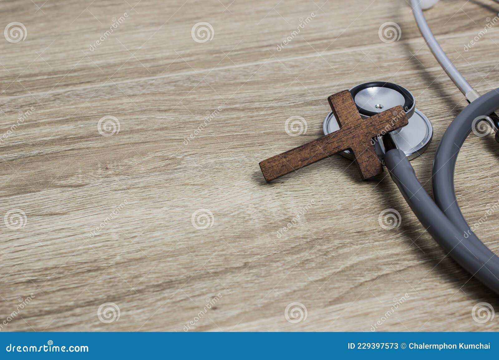 A Magnifying Glass with a Cross on a Wooden Table. Stock Image - Image ...