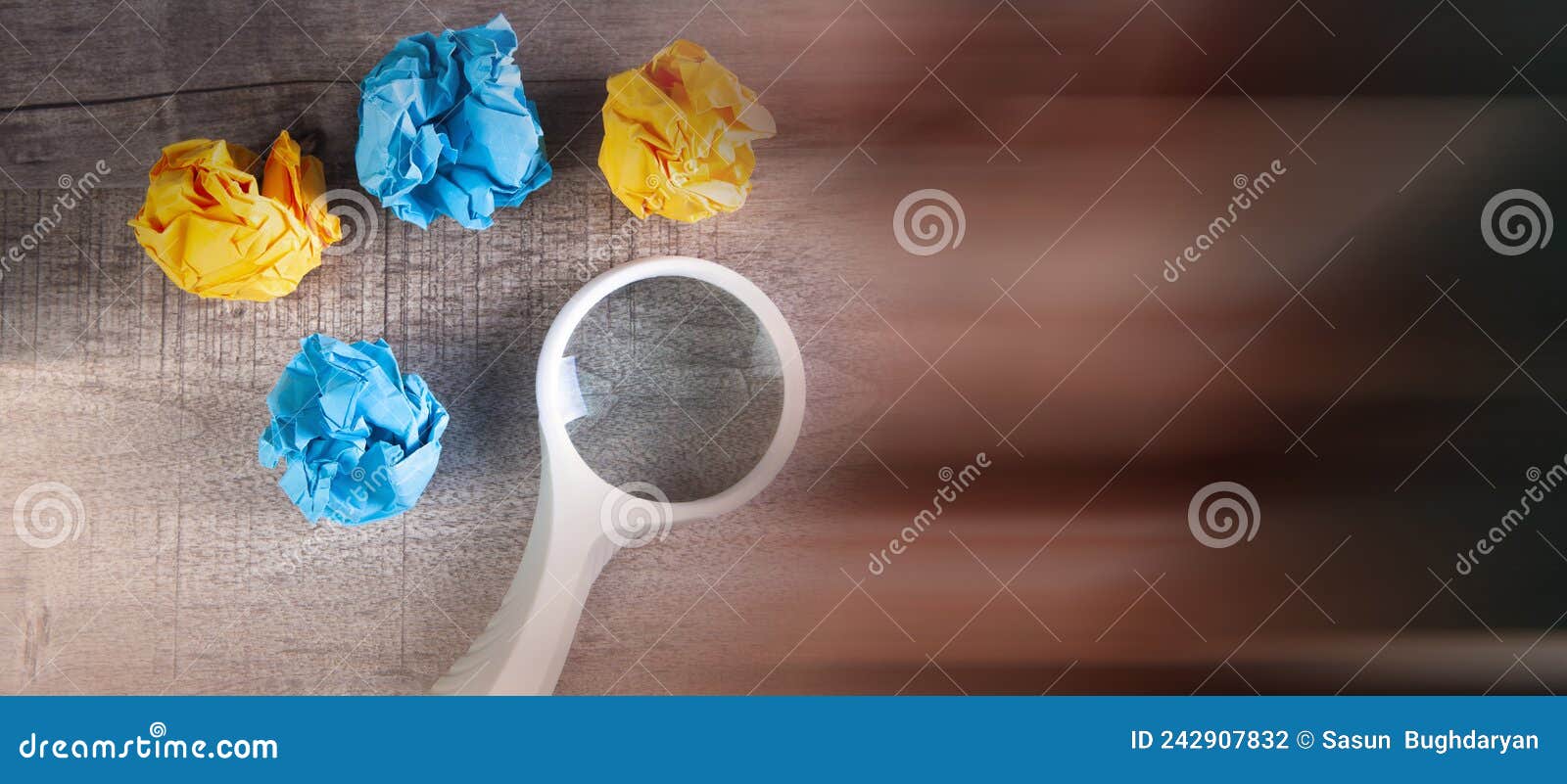 Magnifying Glass and Crumpled Papers on the Table Stock Photo - Image ...