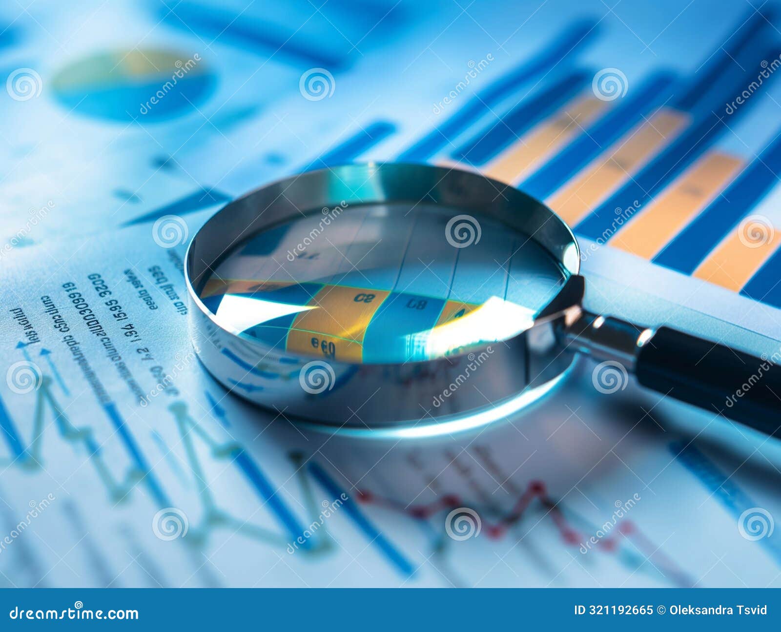 Magnifying Glass and Documents with Analytics Data Lying on Table ...