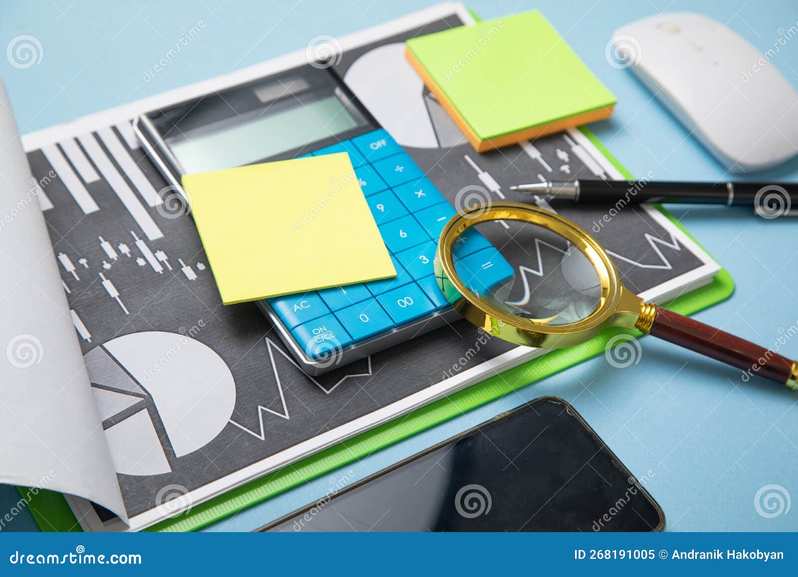 Magnifying Glass Financial Graphs and Other Business Objects Stock ...