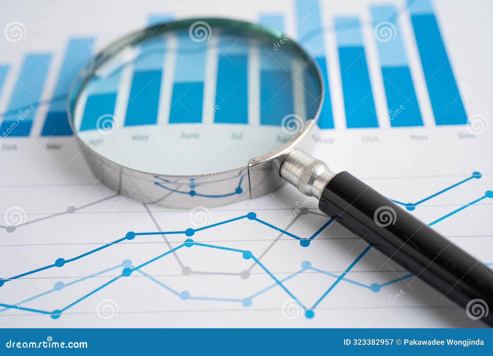 Magnifying Glass on Graph. Finance Business and Trading Stock Image ...