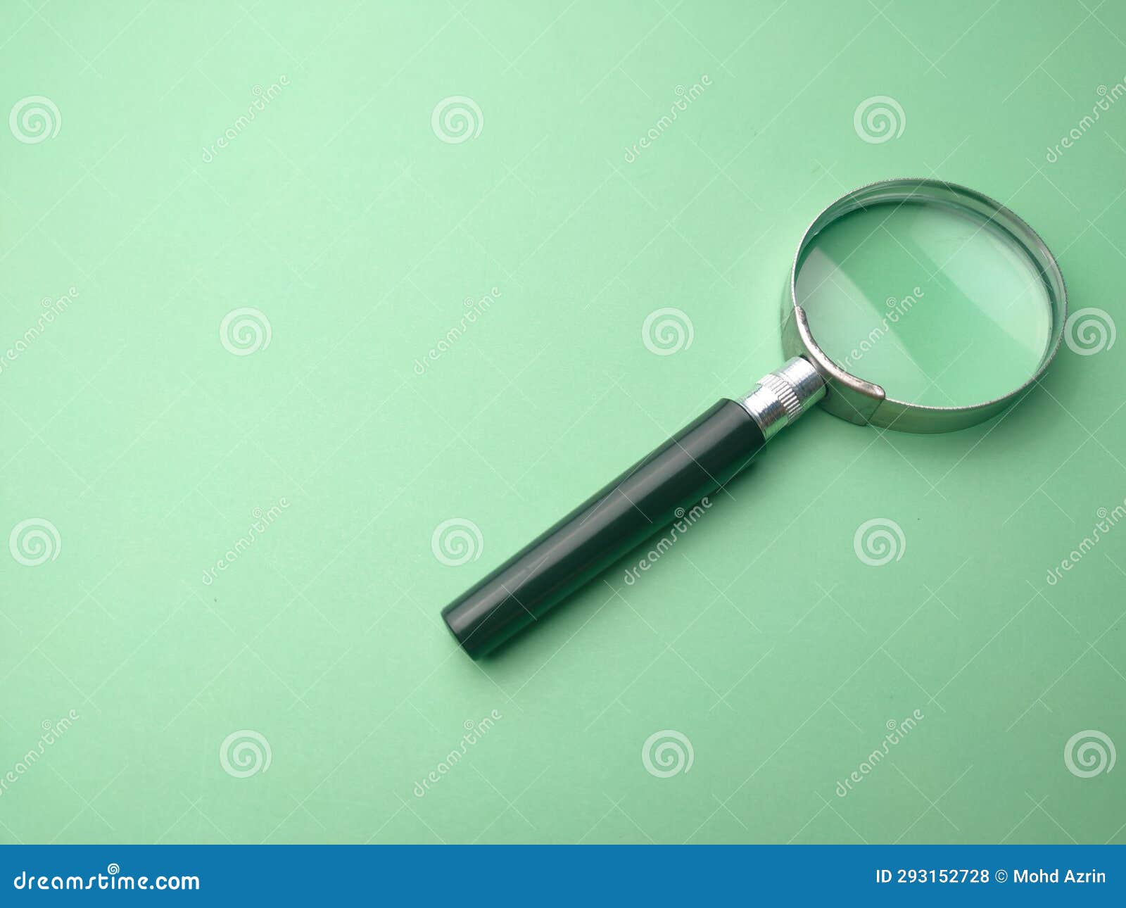 Magnifying Glass on a Green Background Stock Photo - Image of equipment ...