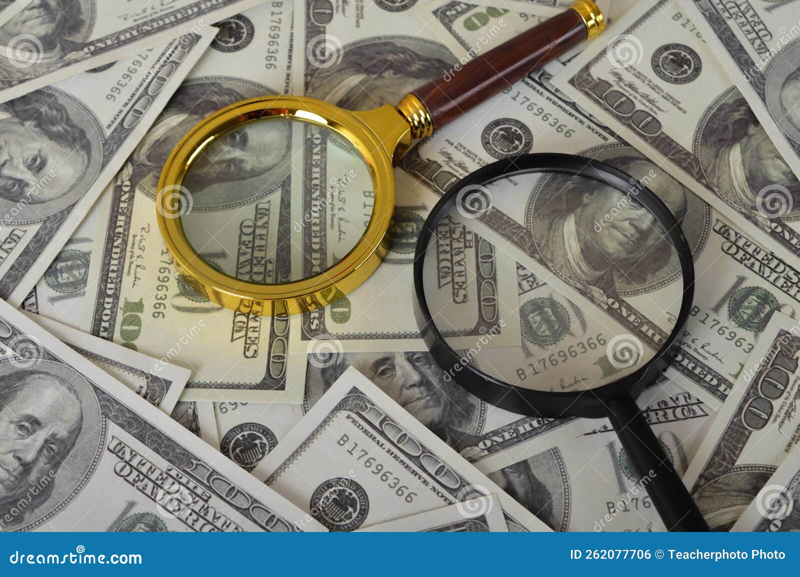 Magnifying Glass and Heap of Dollars. Financial Concept Stock Photo ...