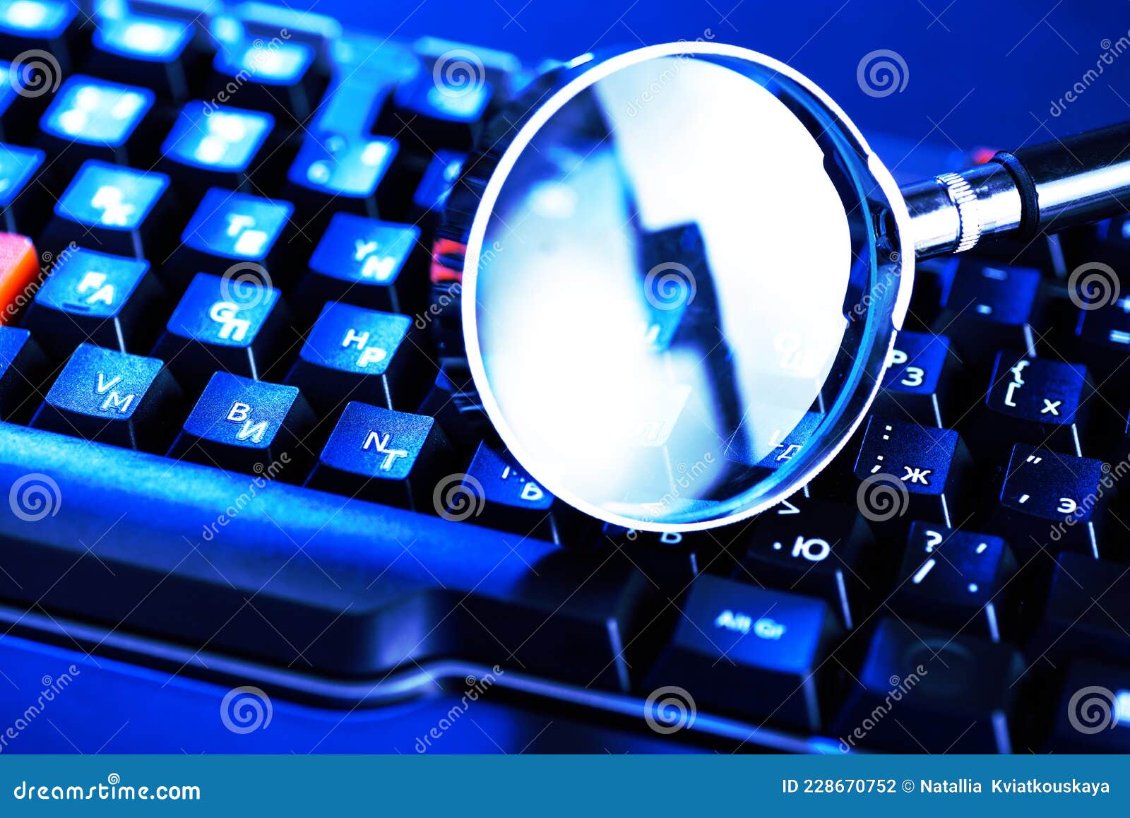 Magnifying Glass on the Keys of a Black Computer Keyboard Stock Photo ...