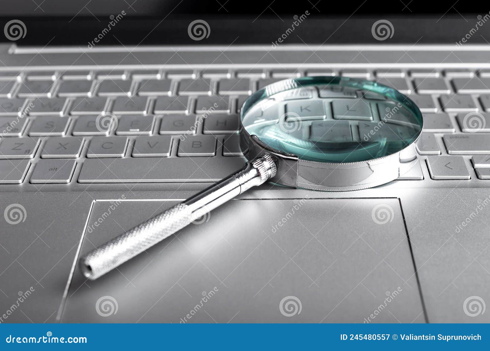 Magnifying Glass on Laptop Keyboard. Internet Surfing Concept. Online ...