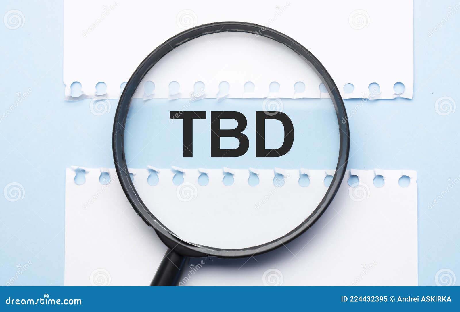 Magnifying Glass Loupe with Sign Tbd between Two Paper Sheets on the ...