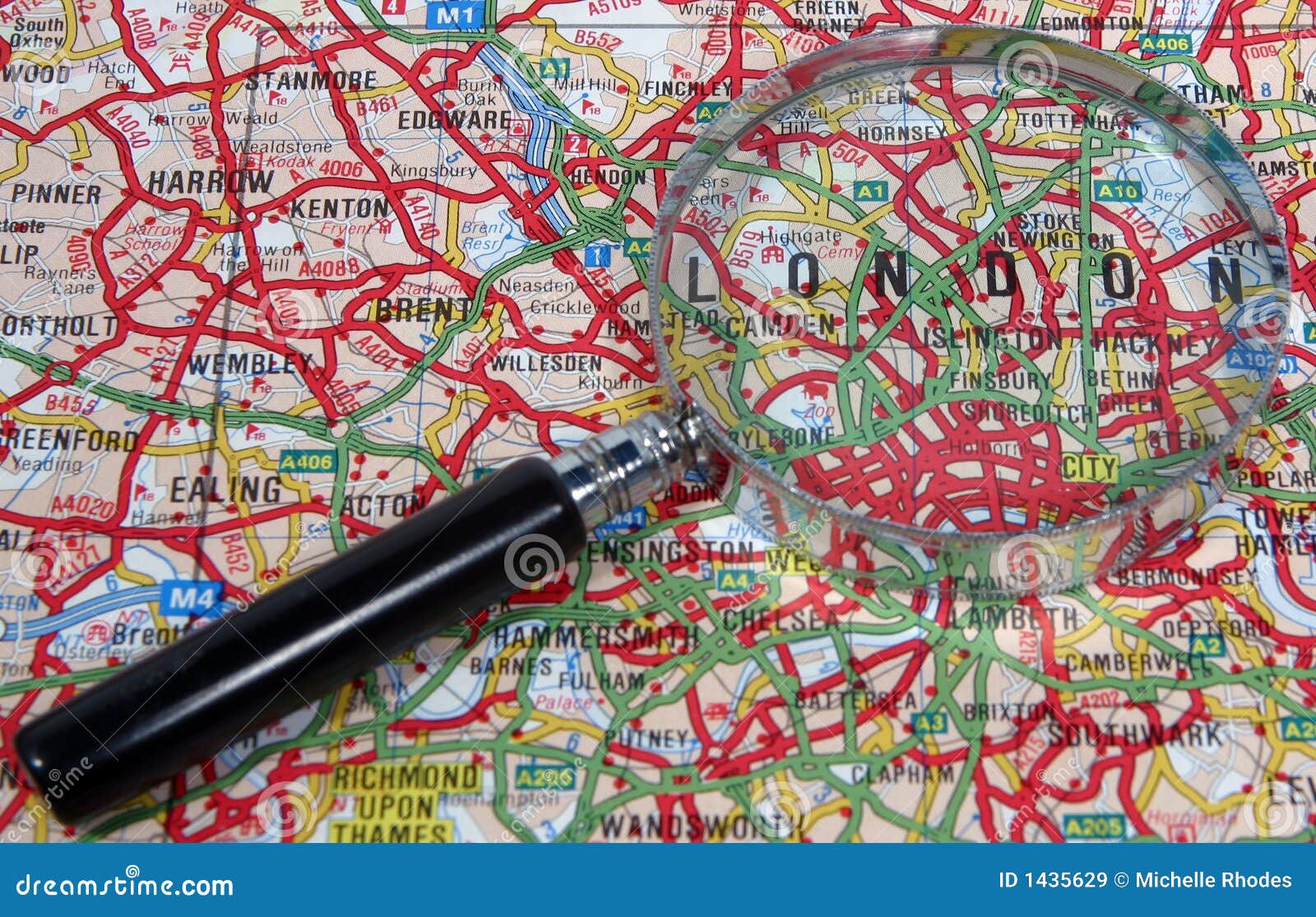Magnifying Glass on Map stock image. Image of colour, roads - 1435629