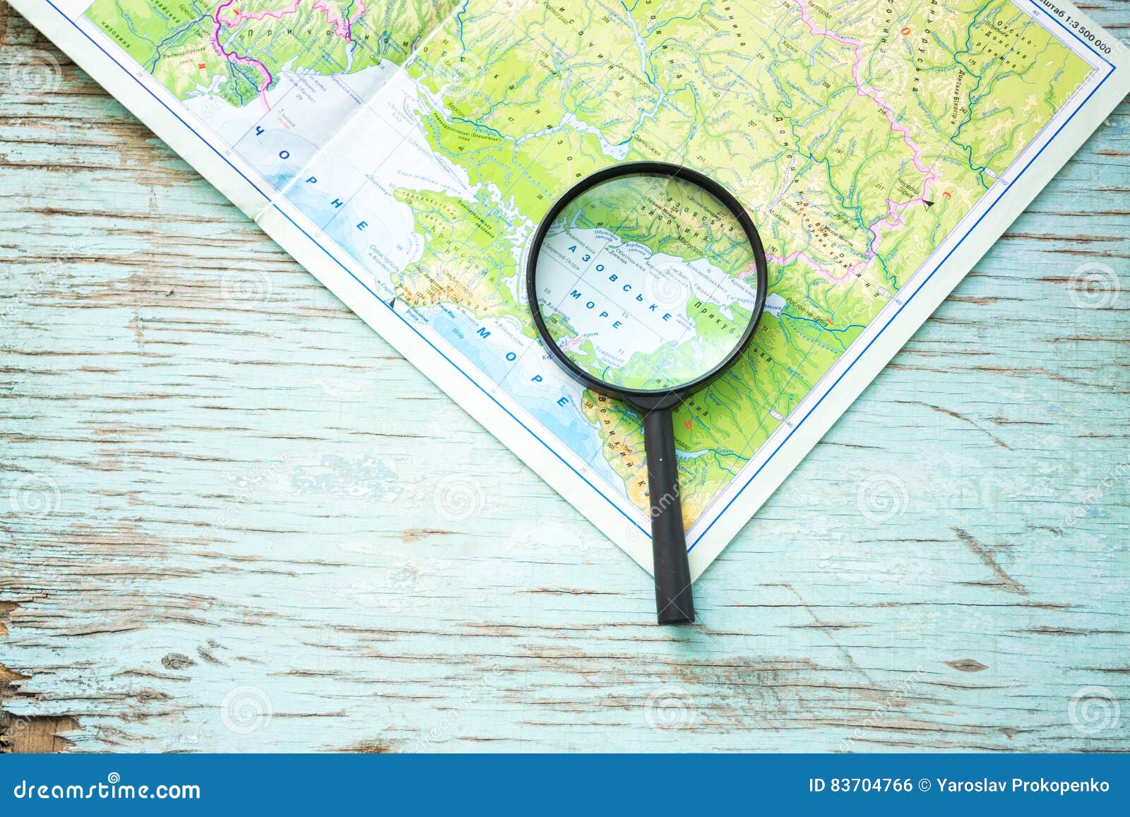 A Magnifying Glass on the Map Background Stock Photo - Image of guide ...