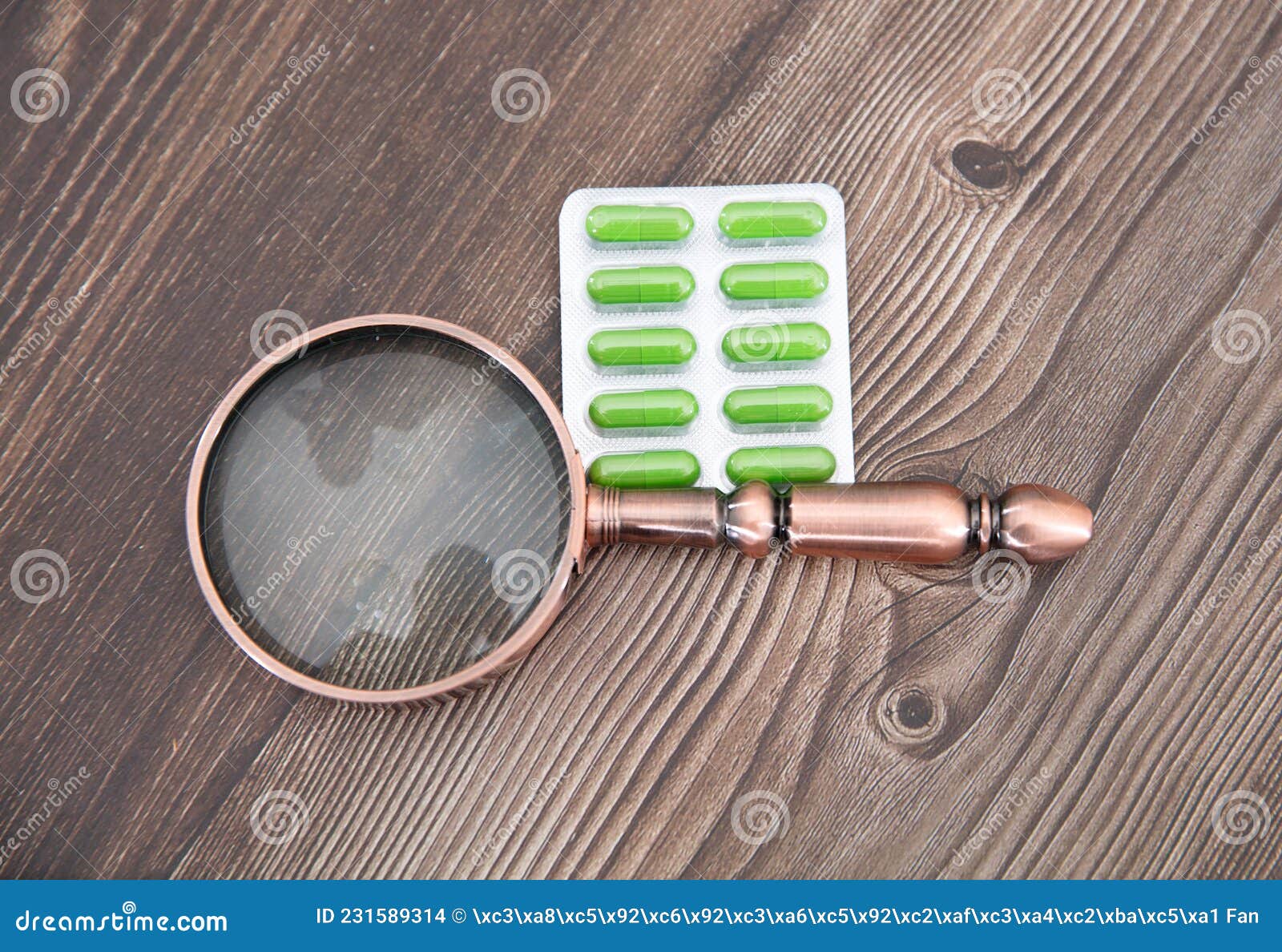 Magnifying Glass and Medical Capsule Stock Photo - Image of medicine ...