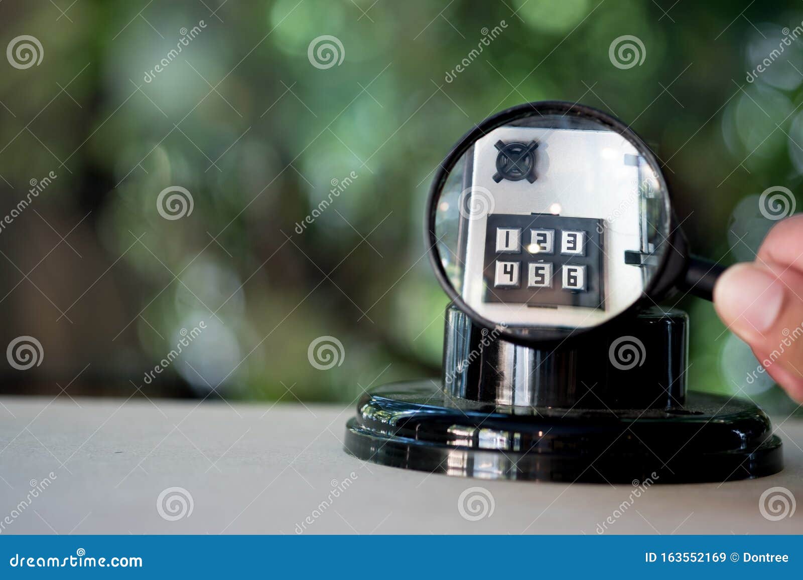 Magnifying Glass on the Number Pad Lock on Safe Box Stock Image - Image ...