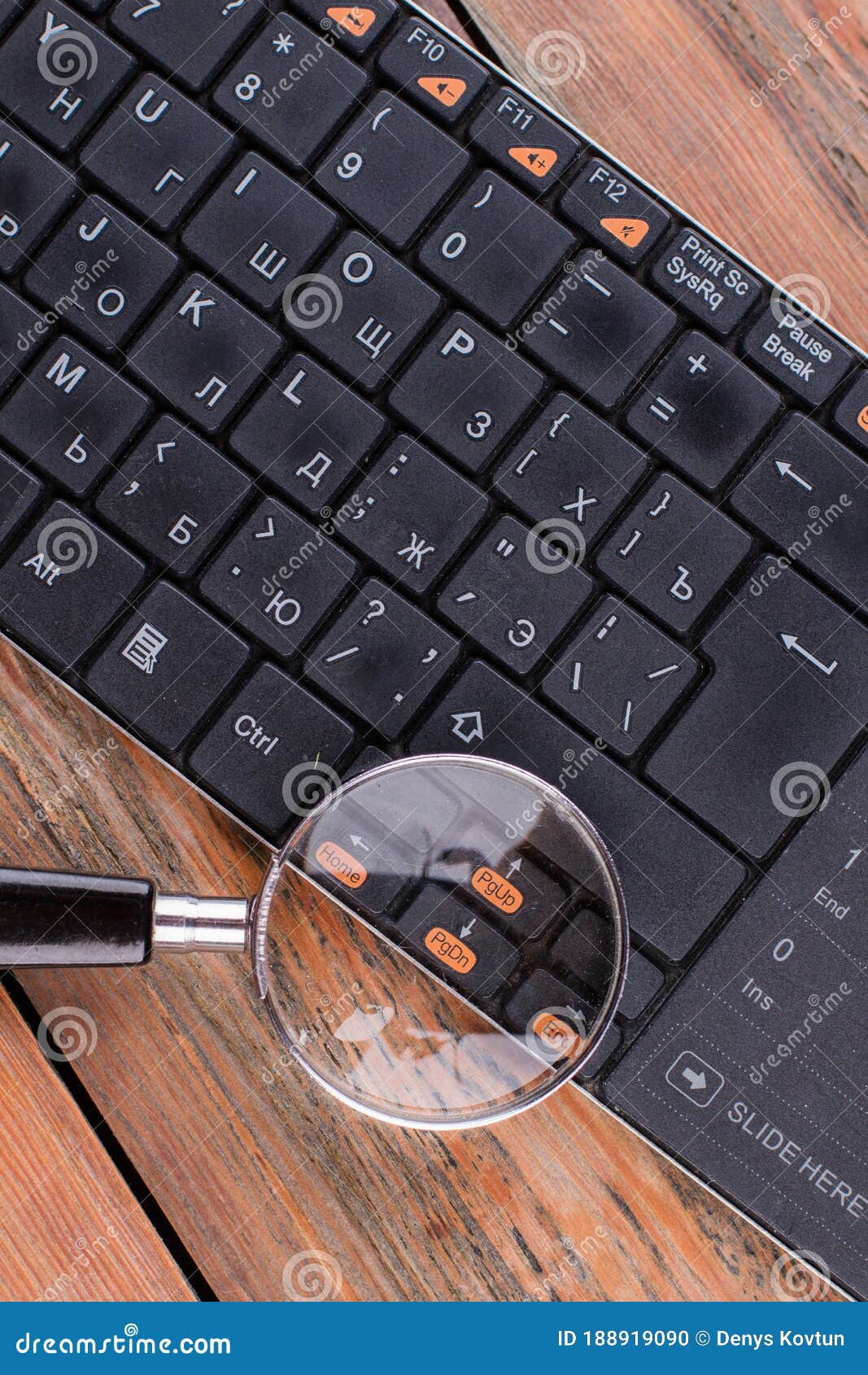 Magnifying Glass Over Arrows Key in the Keyboard. Stock Photo - Image ...