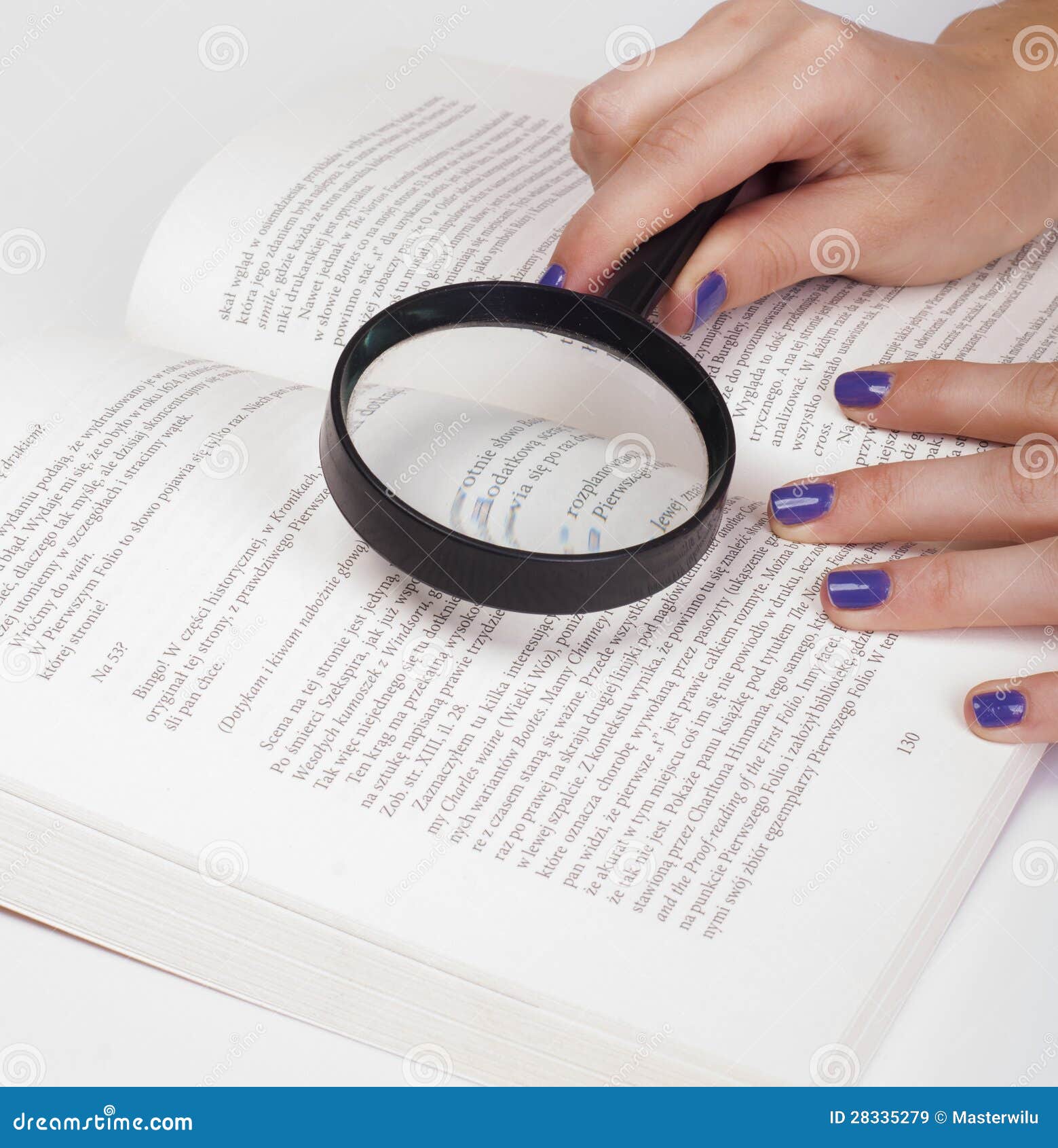 Magnifying glass over book stock image. Image of article - 28335279