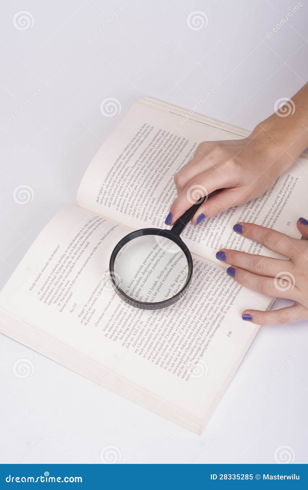 Magnifying glass over book stock image. Image of marker - 28335285