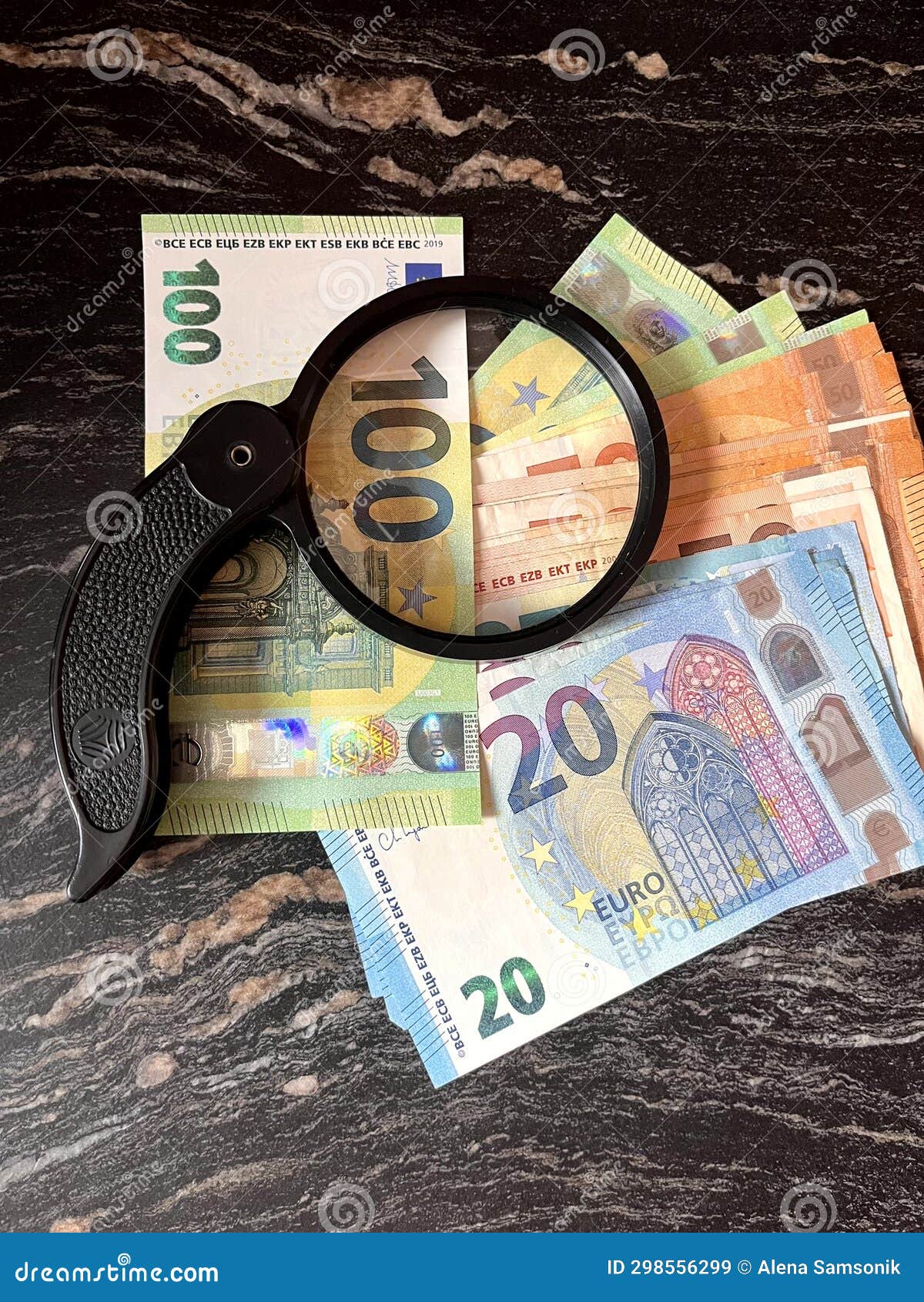 Magnifying Glass Over the Surface Covered with Multiple Euro Bank Note ...