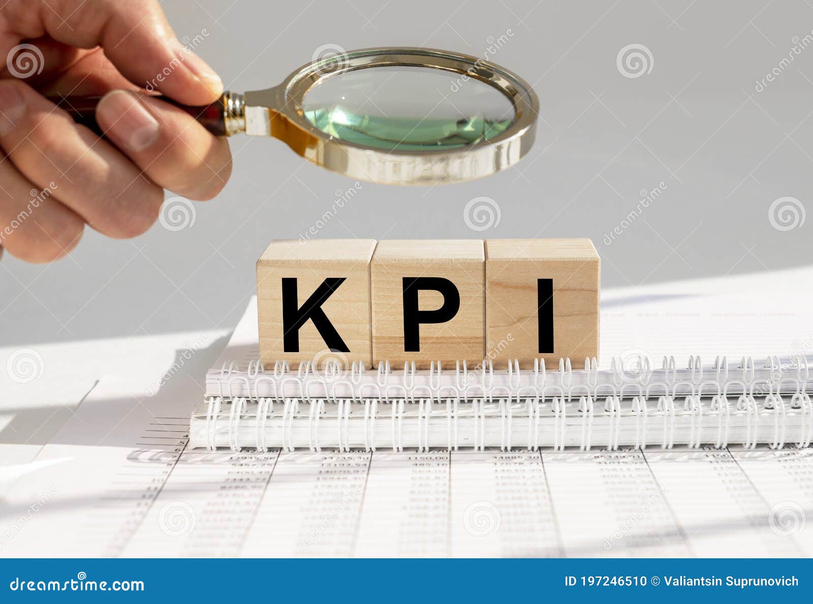 Magnifying Glass Over Text KPI on Wooden Cube Blocks on White Office ...