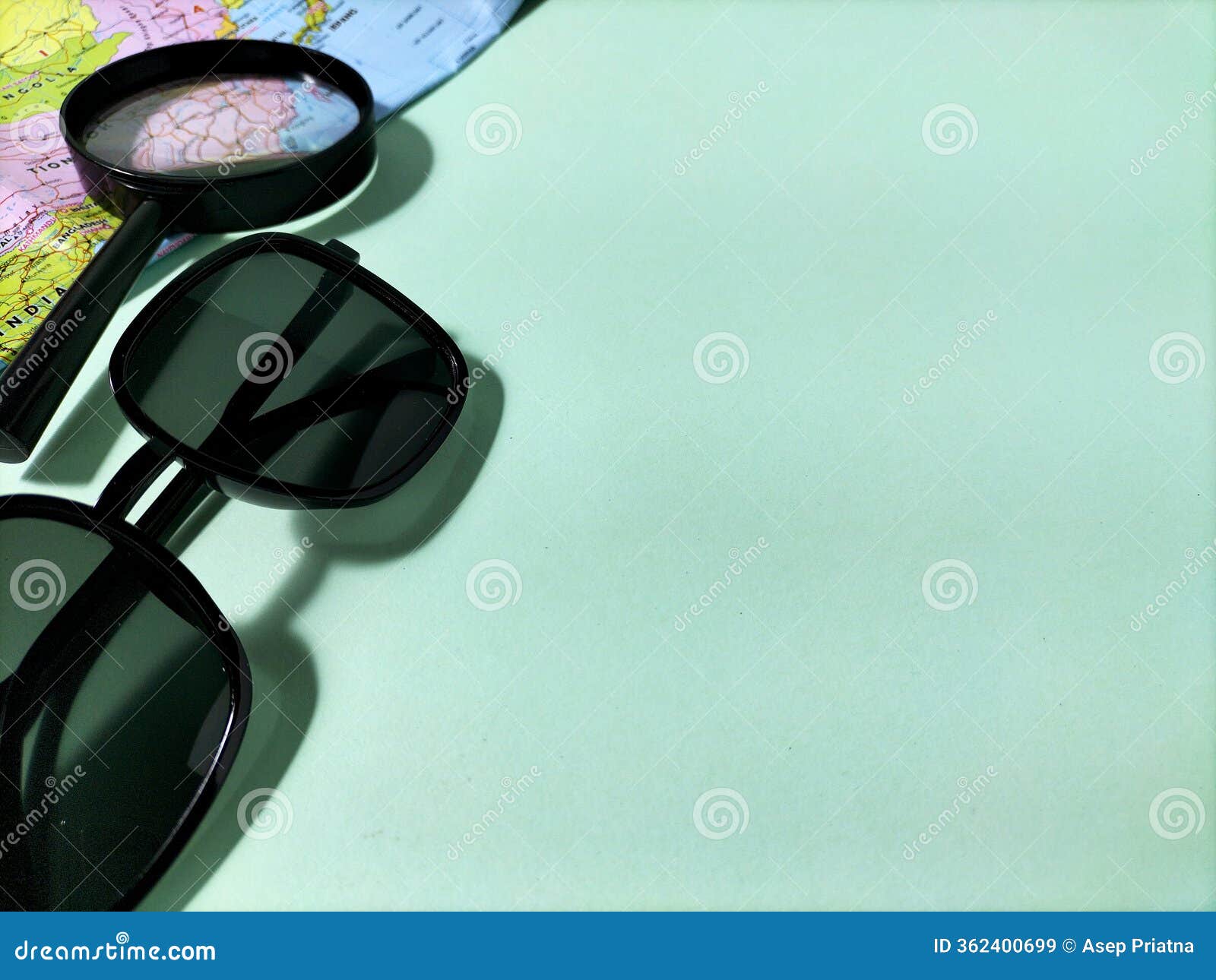 World Map, Glasses, Magnifying Glass on Light Blue Stock Image - Image ...