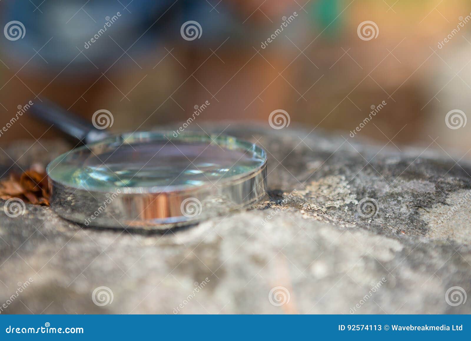 Magnifying Glass on the Rock Stock Image - Image of exploration, travel ...