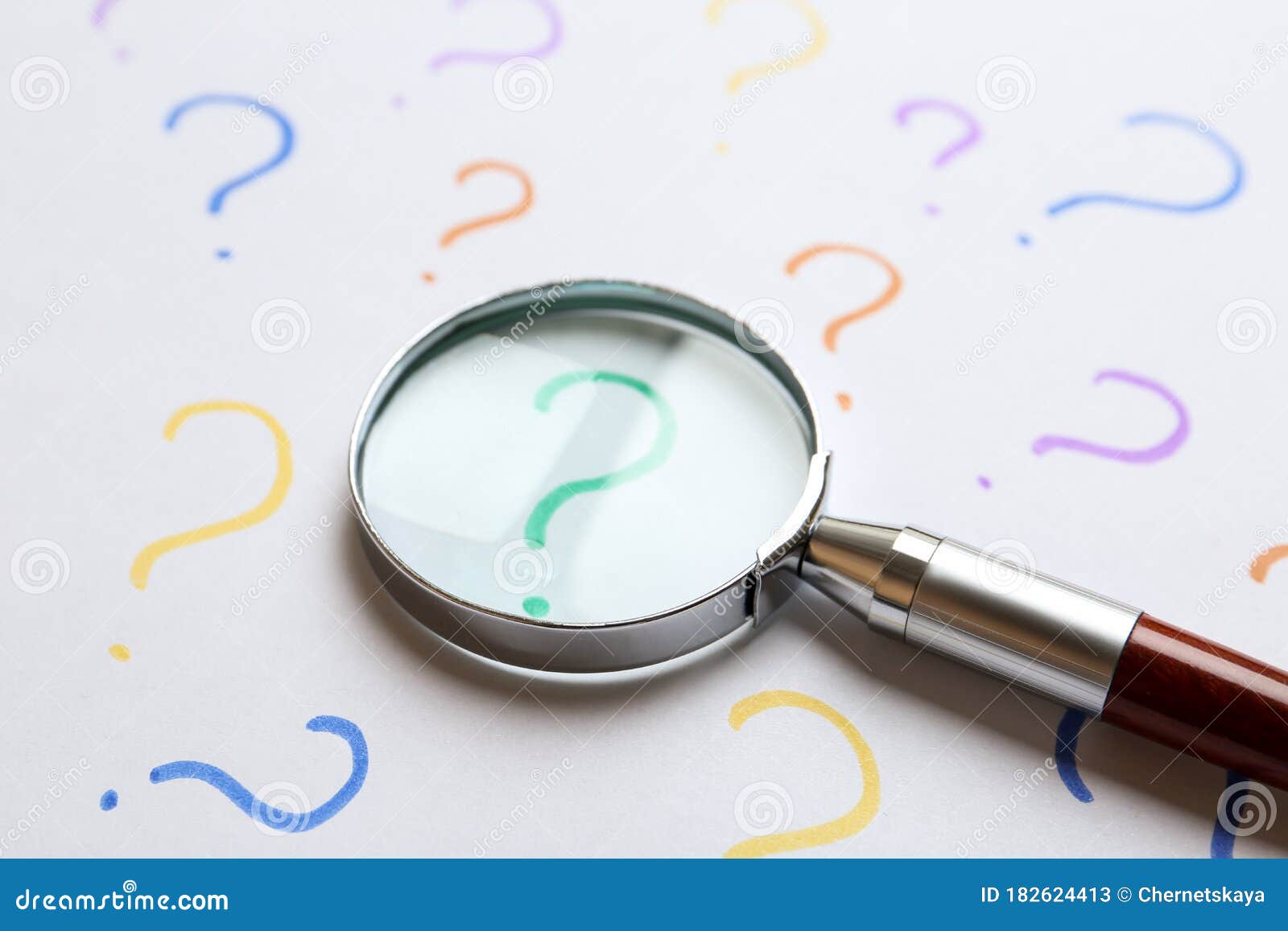 Magnifying Glass on Sheet of Paper with Question Marks. Search Stock ...