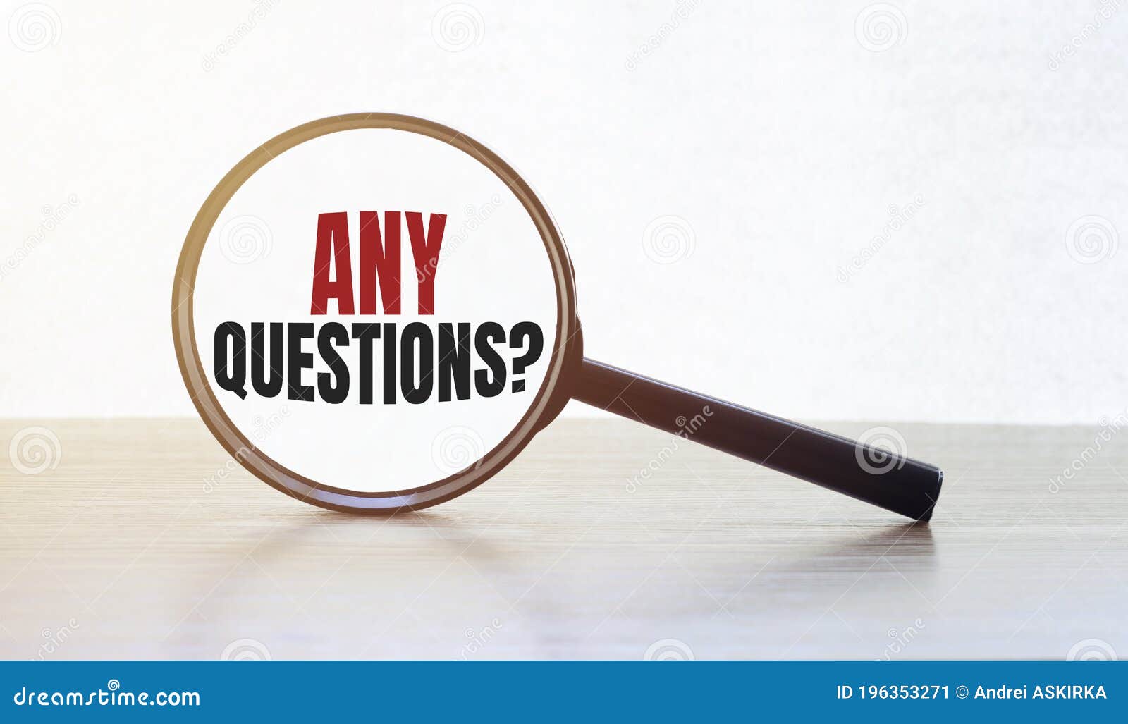 Magnifying Glass with Text ANY QUESTIONS on Wooden Table Stock Image ...