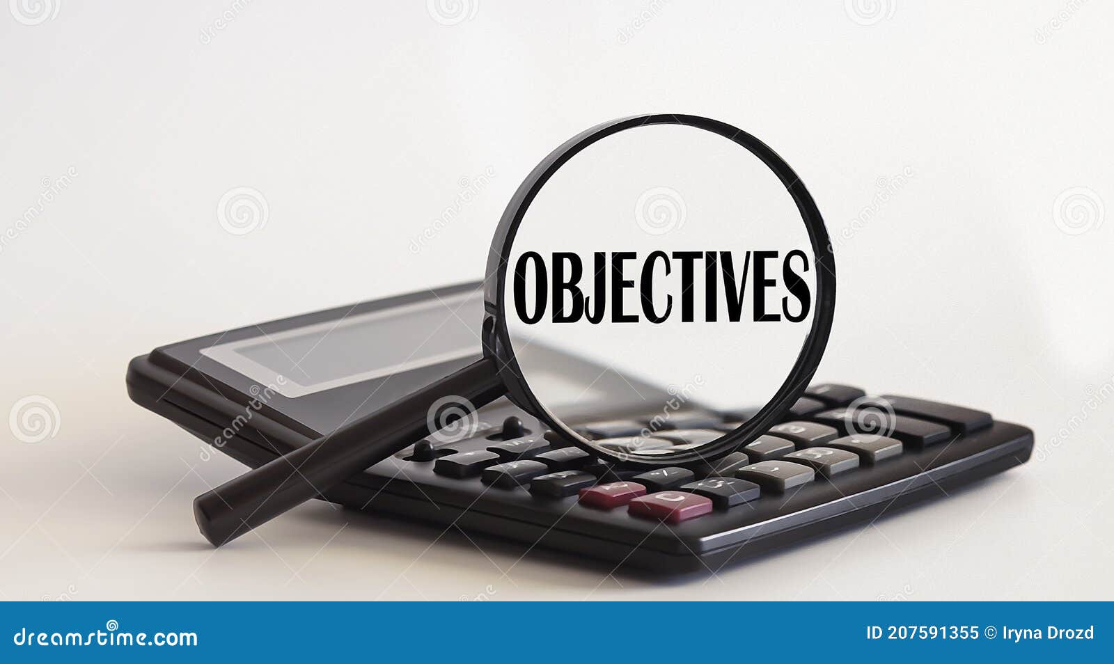 Magnifying Glass with Text Objectives on Calculator Stock Image - Image ...