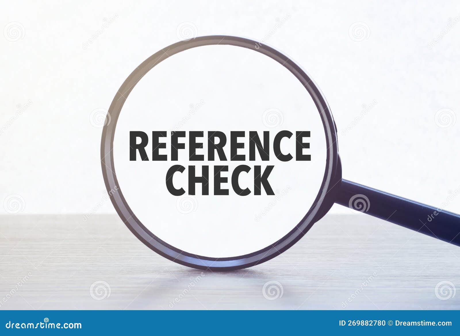 Magnifying Glass with Text REFERENCE CHECKS on Wooden Table Stock Photo ...