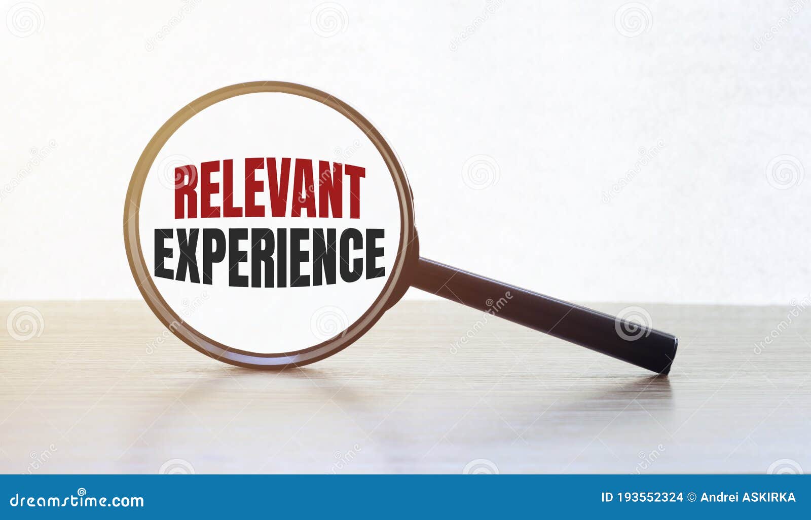 Magnifying Glass with Text RELEVANT EXPERIENCE on Wooden Table Stock ...