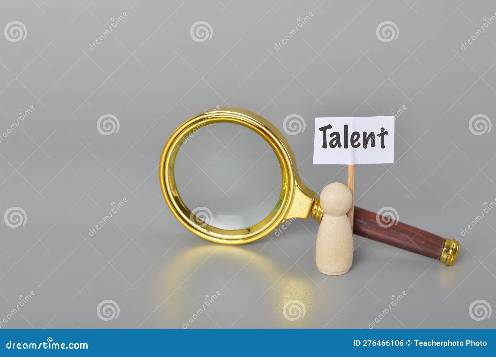Magnifying Glass and Wooden Figure with Text TALENT Stock Photo - Image ...