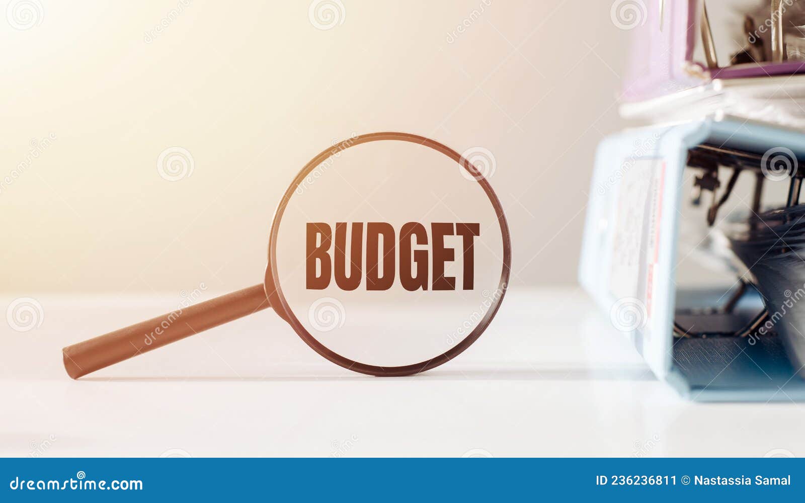 Magnifying Glass with the Word BUDGET on Office Table Stock Image ...