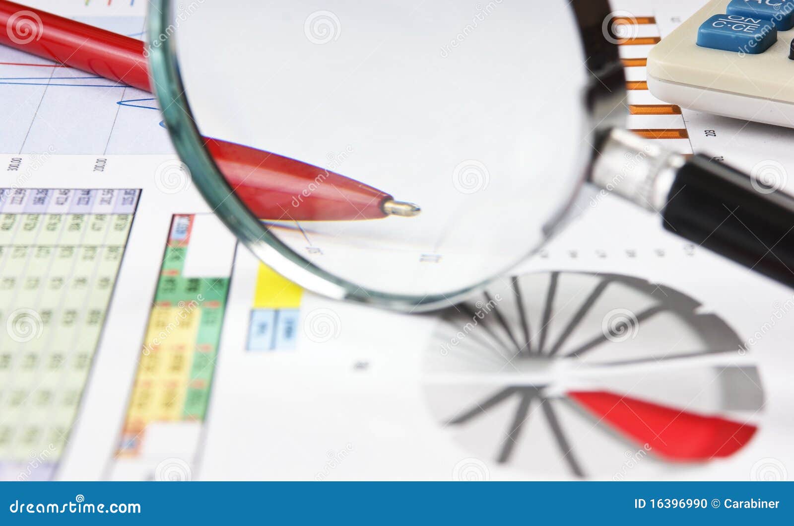 Magnifying Glass and the Working Paper Stock Photo - Image of graphs ...