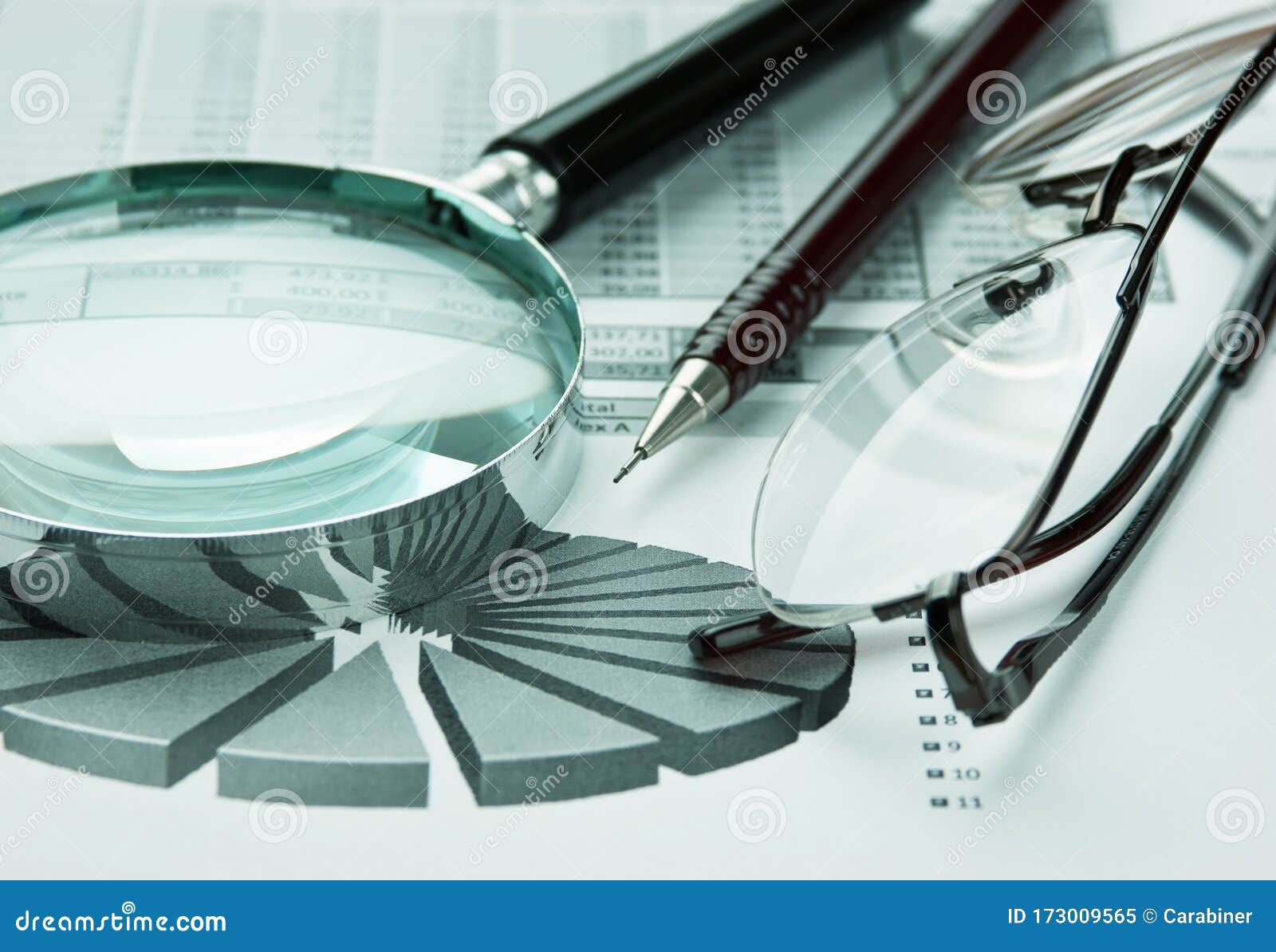 Magnifying Glass and Working Paper Stock Image - Image of graphs ...