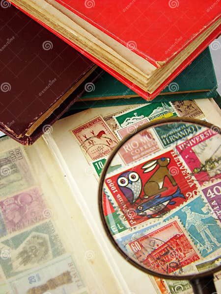 Magnifying Glass and World Postage Stamps Editorial Stock Image - Image ...