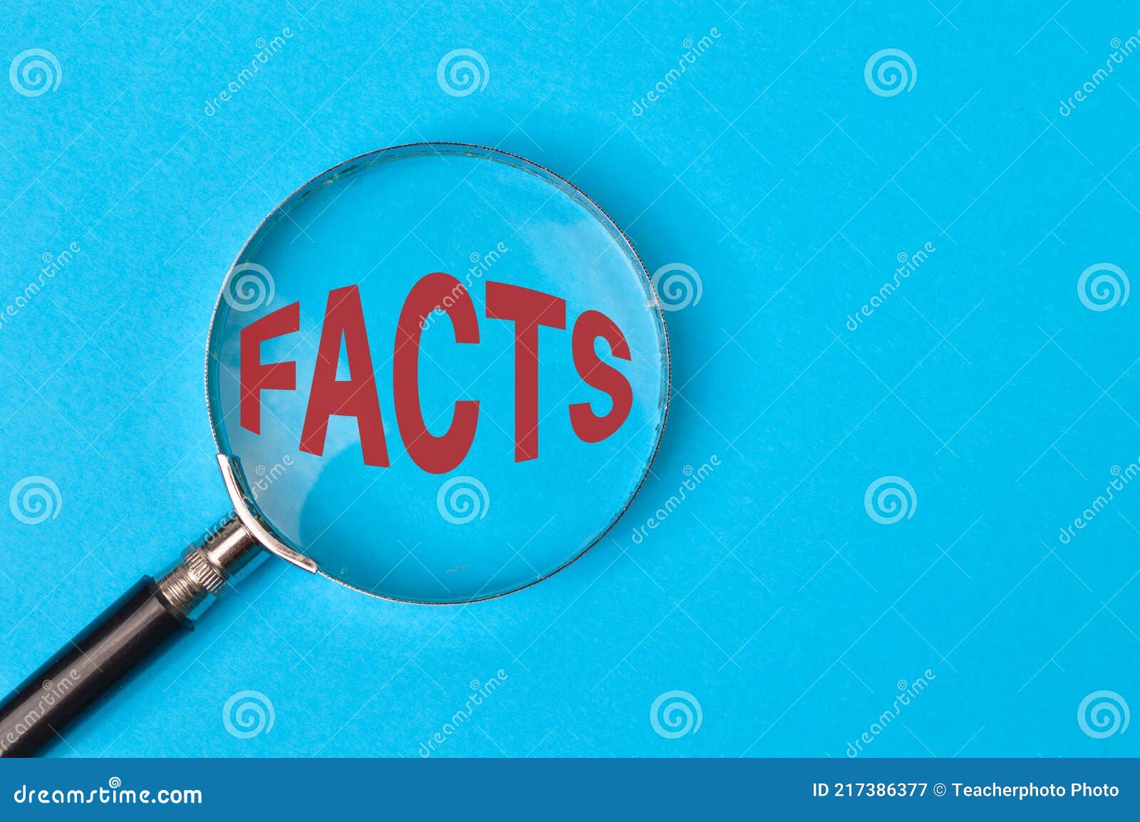 Magnifying Glass Written with Text FACTS Over Blue Background Stock ...
