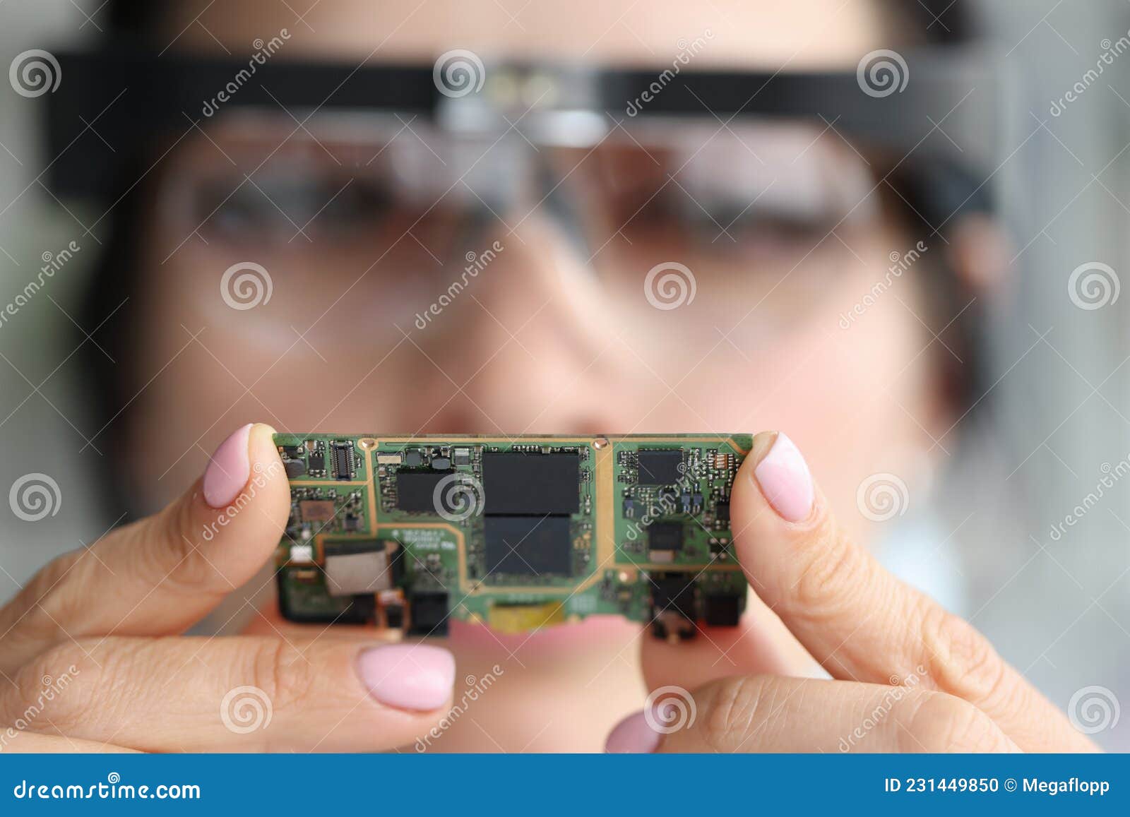 Through Magnifying Lens, Engineer Looks at Computer Chip Stock Photo ...