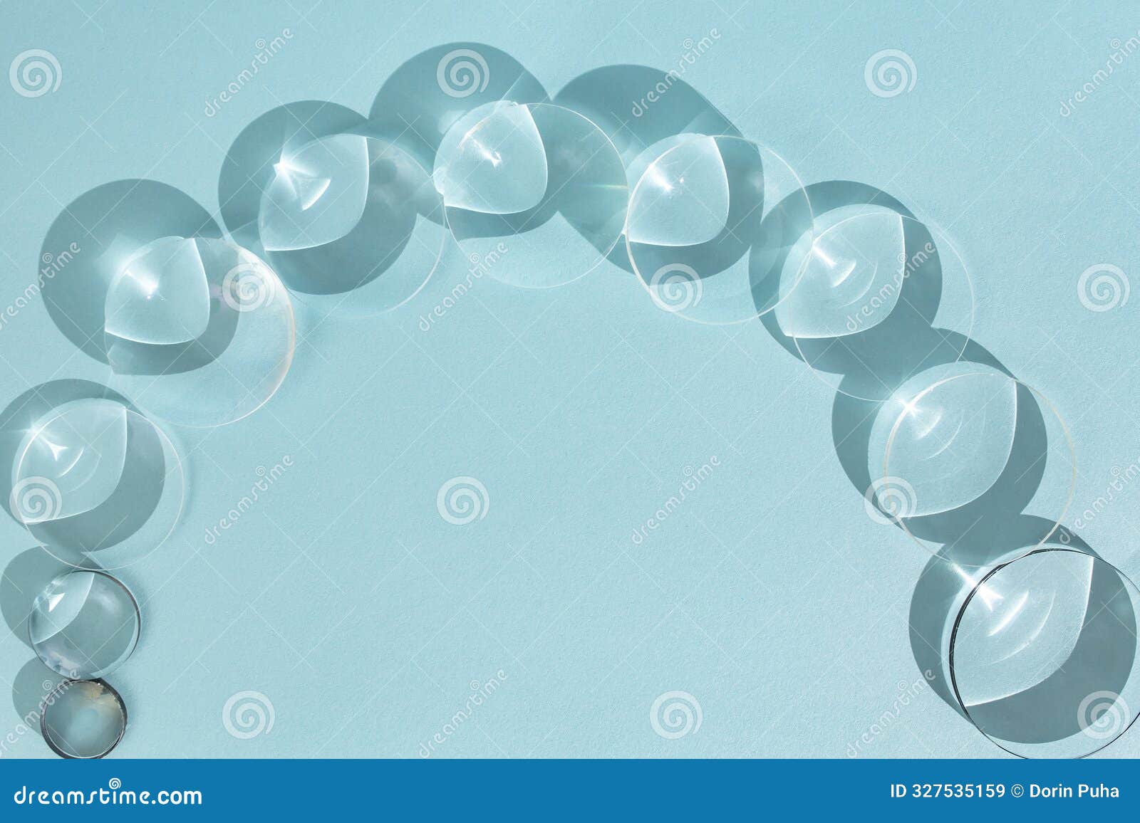 Magnifying Lenses in Arch Shape Flat Lay on Blue Background with Hard ...