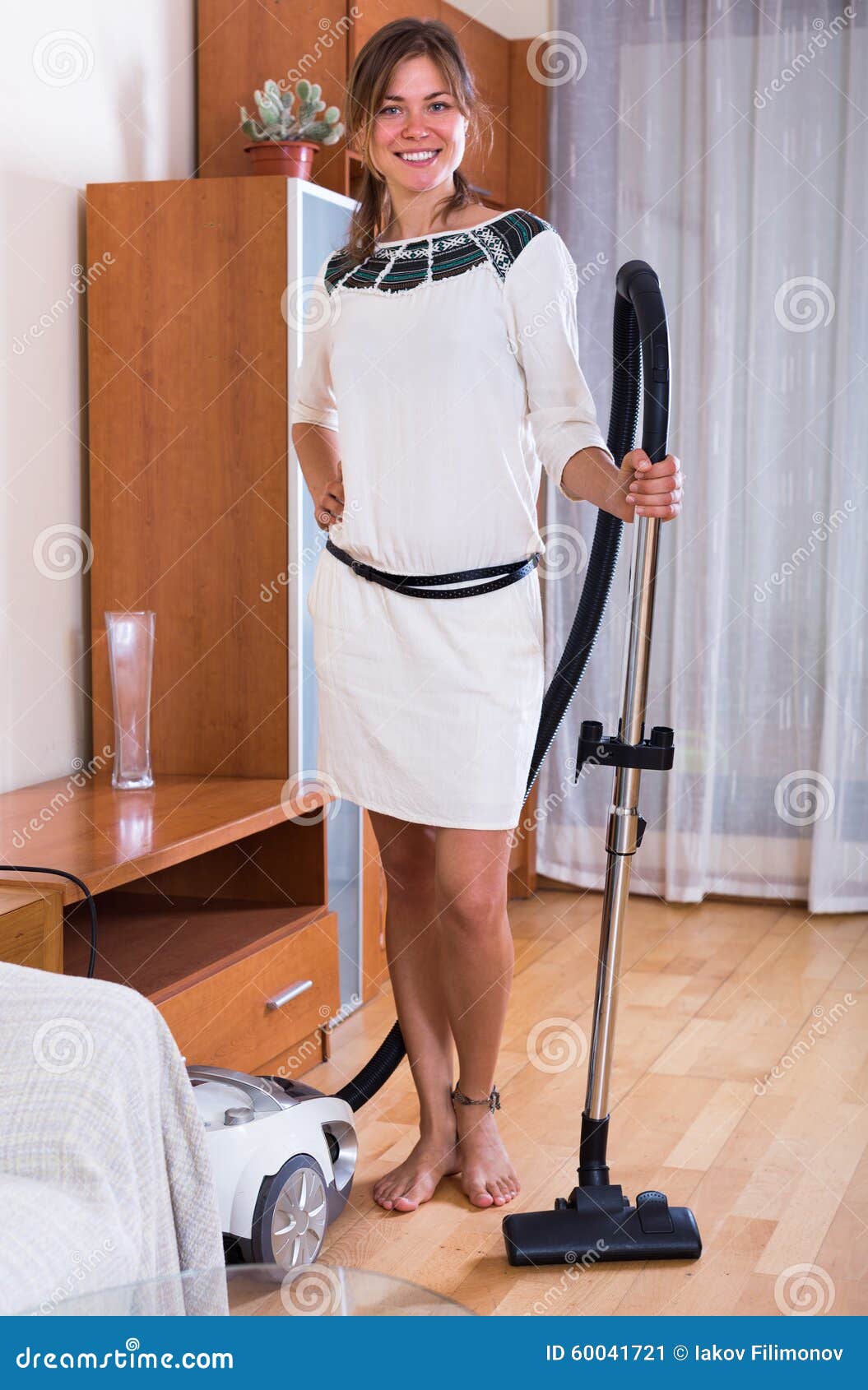 Maid Doing Regular Clean-up and Using Hoover Stock Image - Image of ...