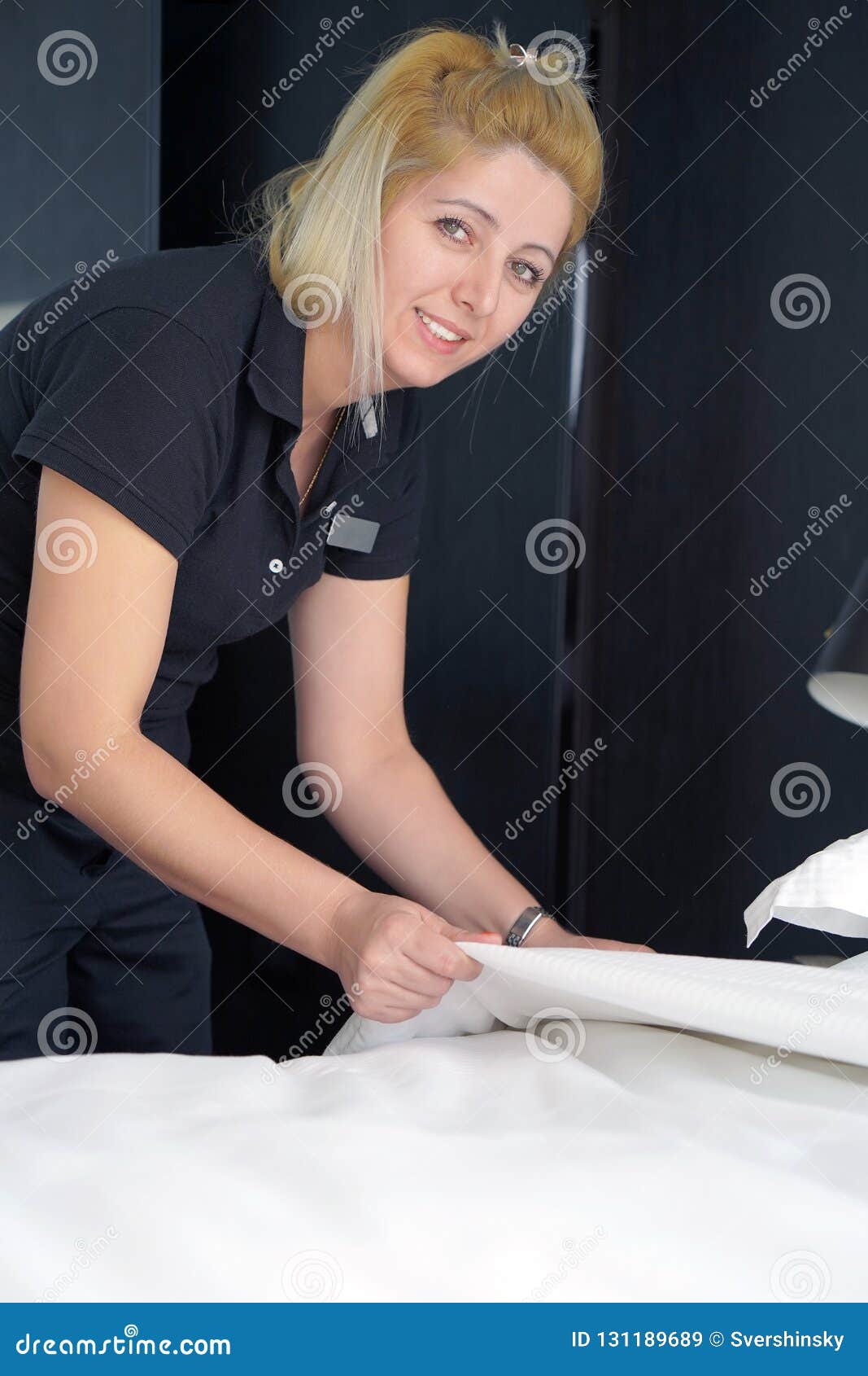 Maid Making Bed stock image. Image of domestic, cleaning - 131189689