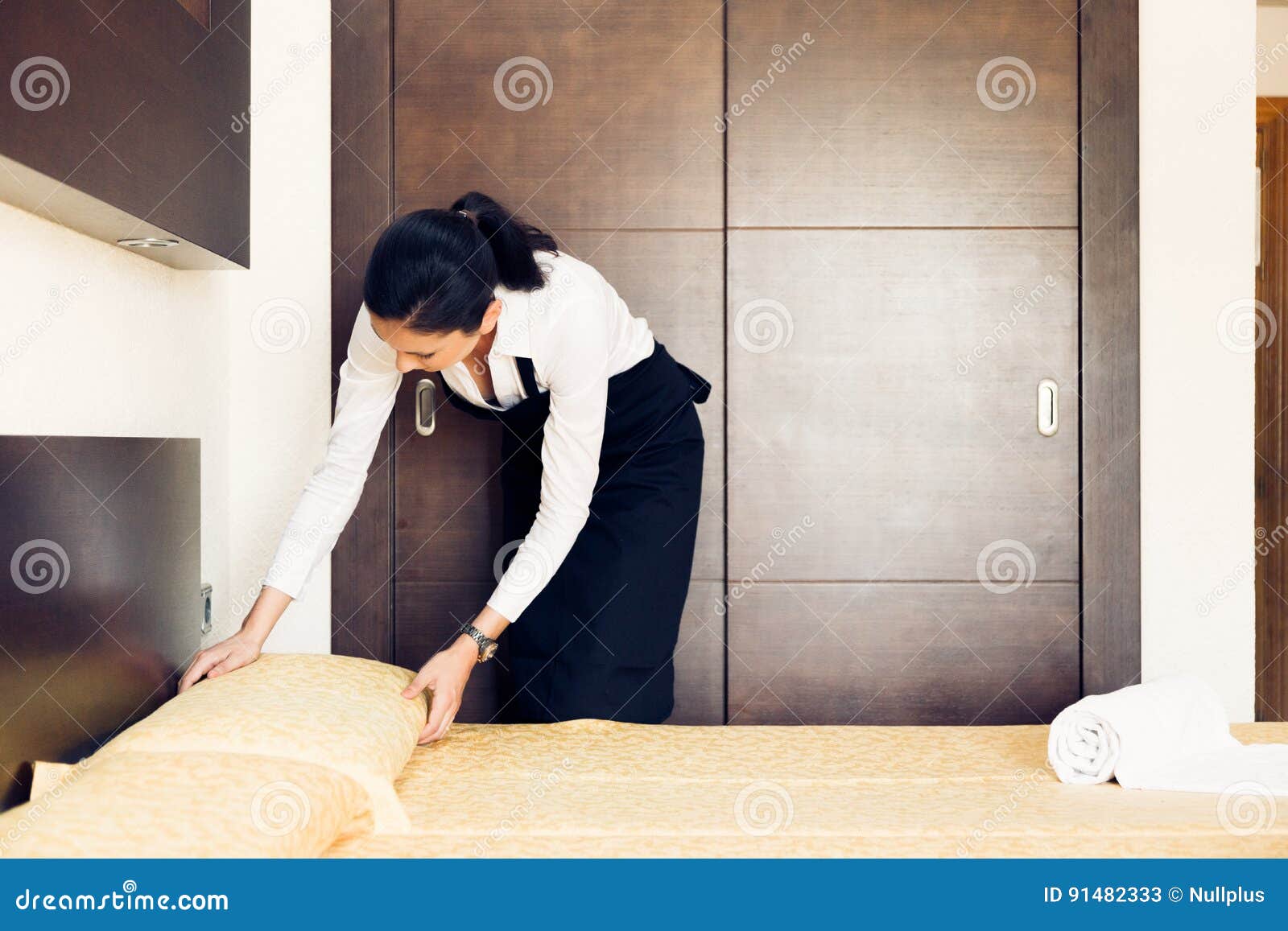 Maid Making a Hotel Room stock image. Image of cleaner - 91482333