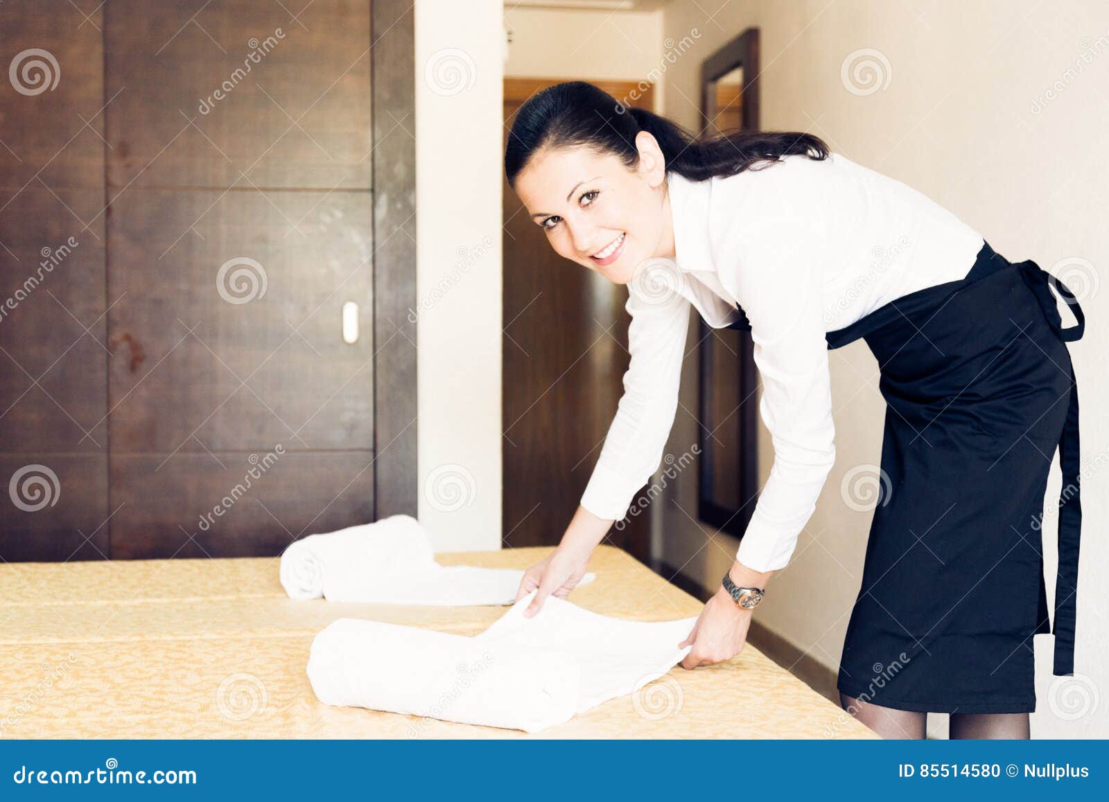 Maid Making a Hotel Room stock photo. Image of adult - 85514580