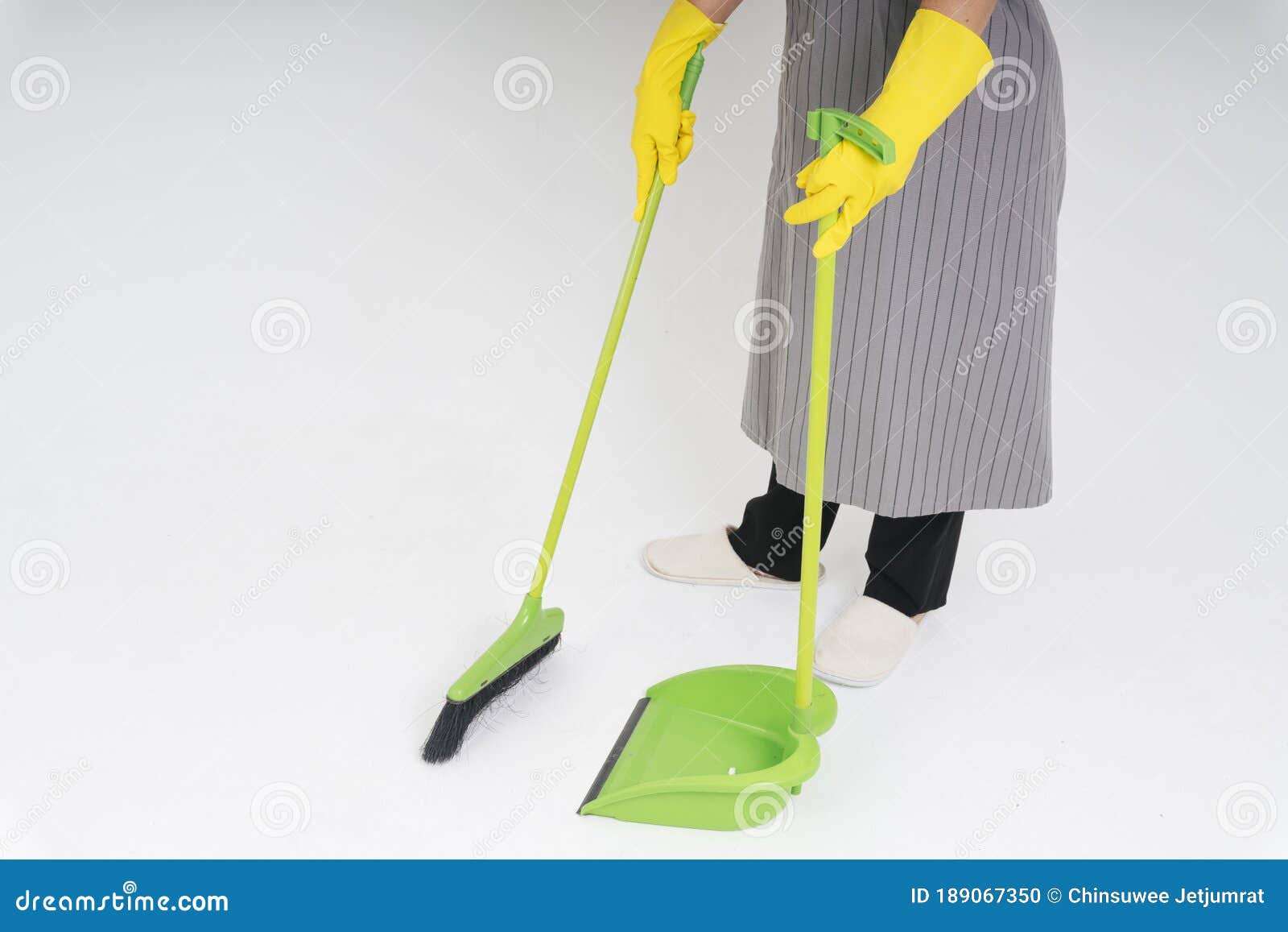 Maid Using Bloom and Dustpan Cleaning Floor Stock Photo - Image of ...