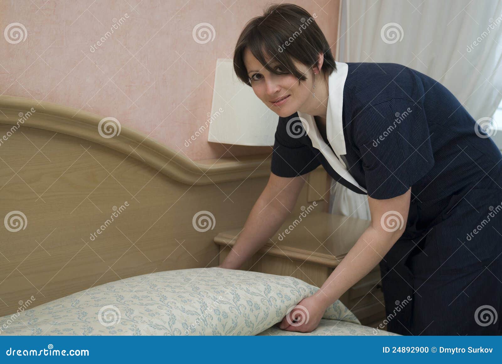 Maid working in hotel room stock photo. Image of labor - 24892900