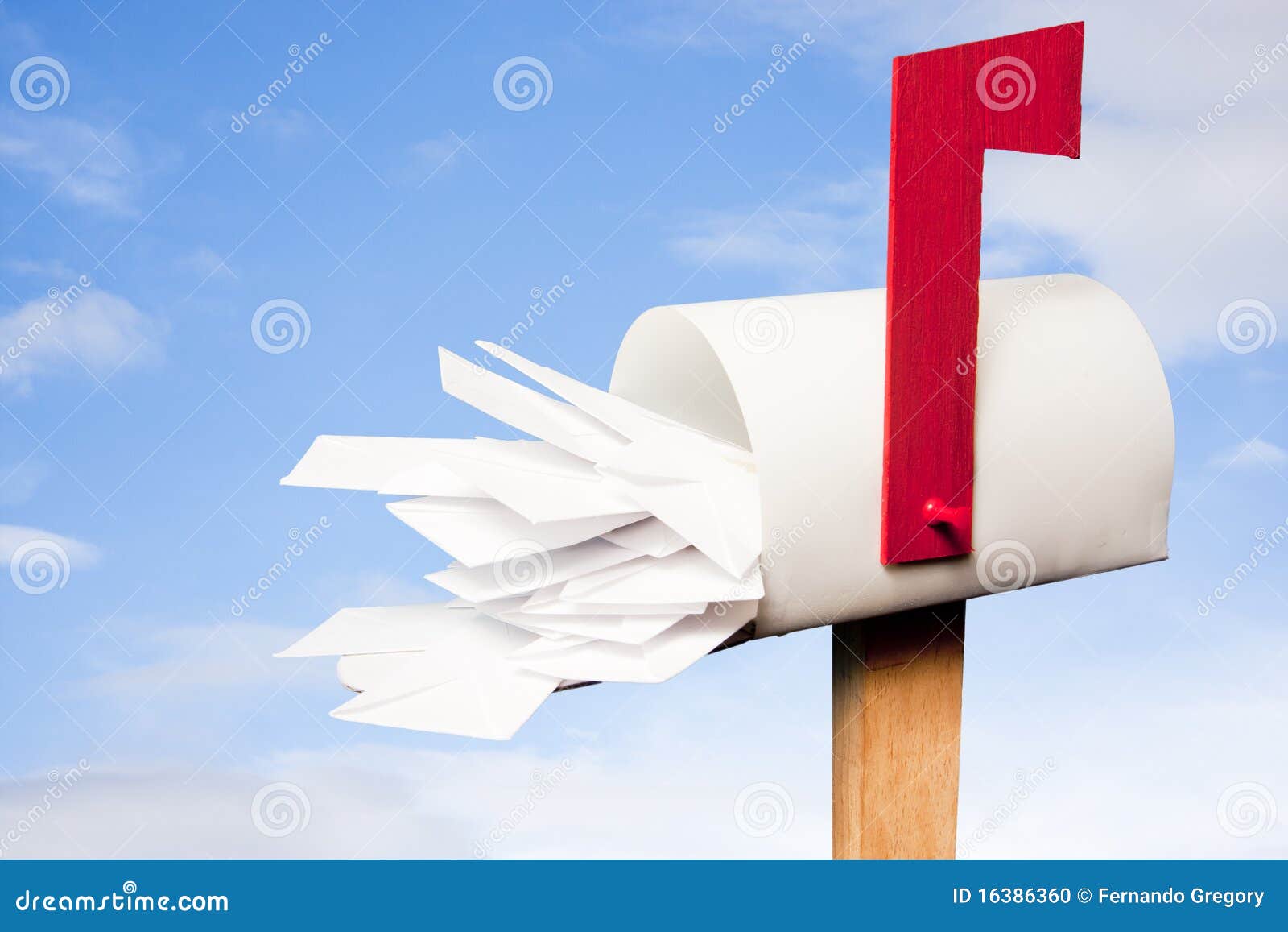 Mail Box Overflowing with Mail Against Sky Stock Photo - Image of ...