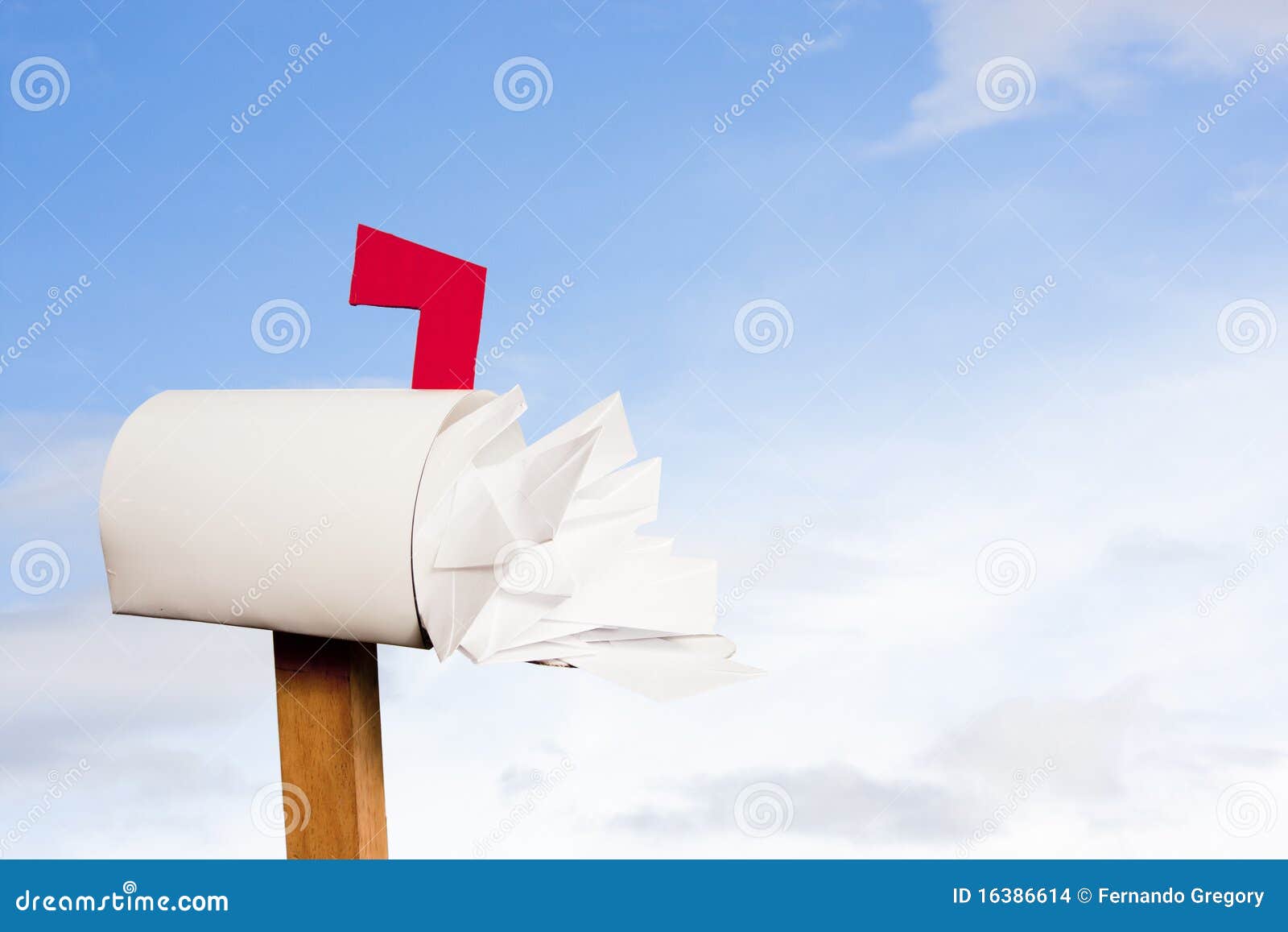 Mail Box Overflowing with Mail Against Sky Stock Photo - Image of space ...