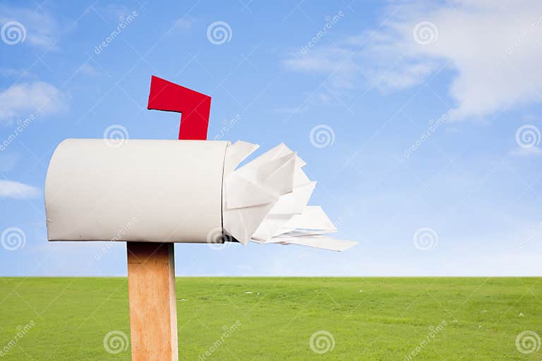 Mail Box Overflowing with Mail Against Sky Stock Photo - Image of sunny ...