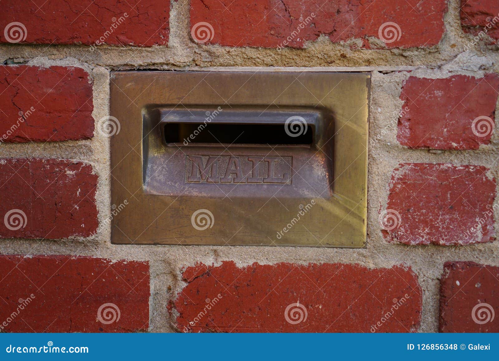 Mailbox in red brick wall stock photo. Image of text - 126856348