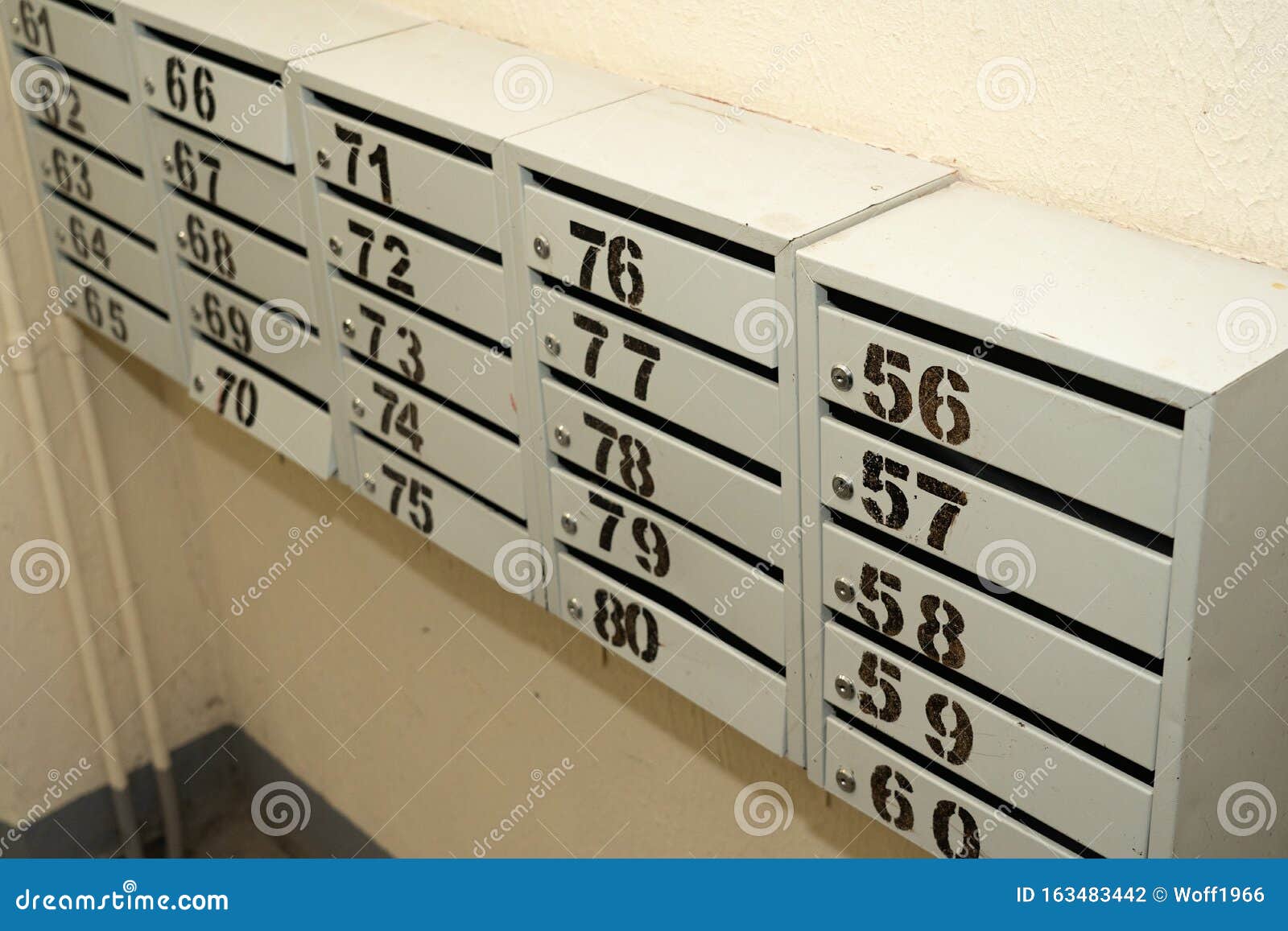 Mailboxes in a Residential Apartment Building. Apartment Numbers on ...