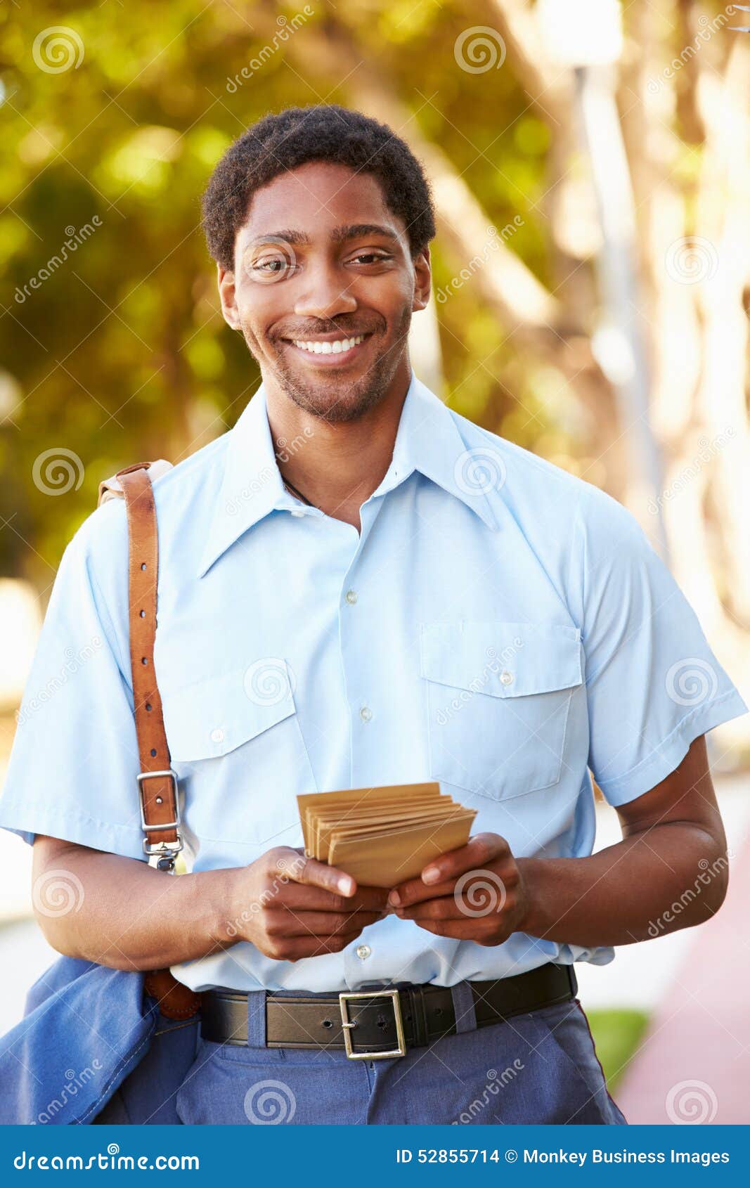 Mailman Walking Along Street Delivering Letters Stock Photo - Image of ...