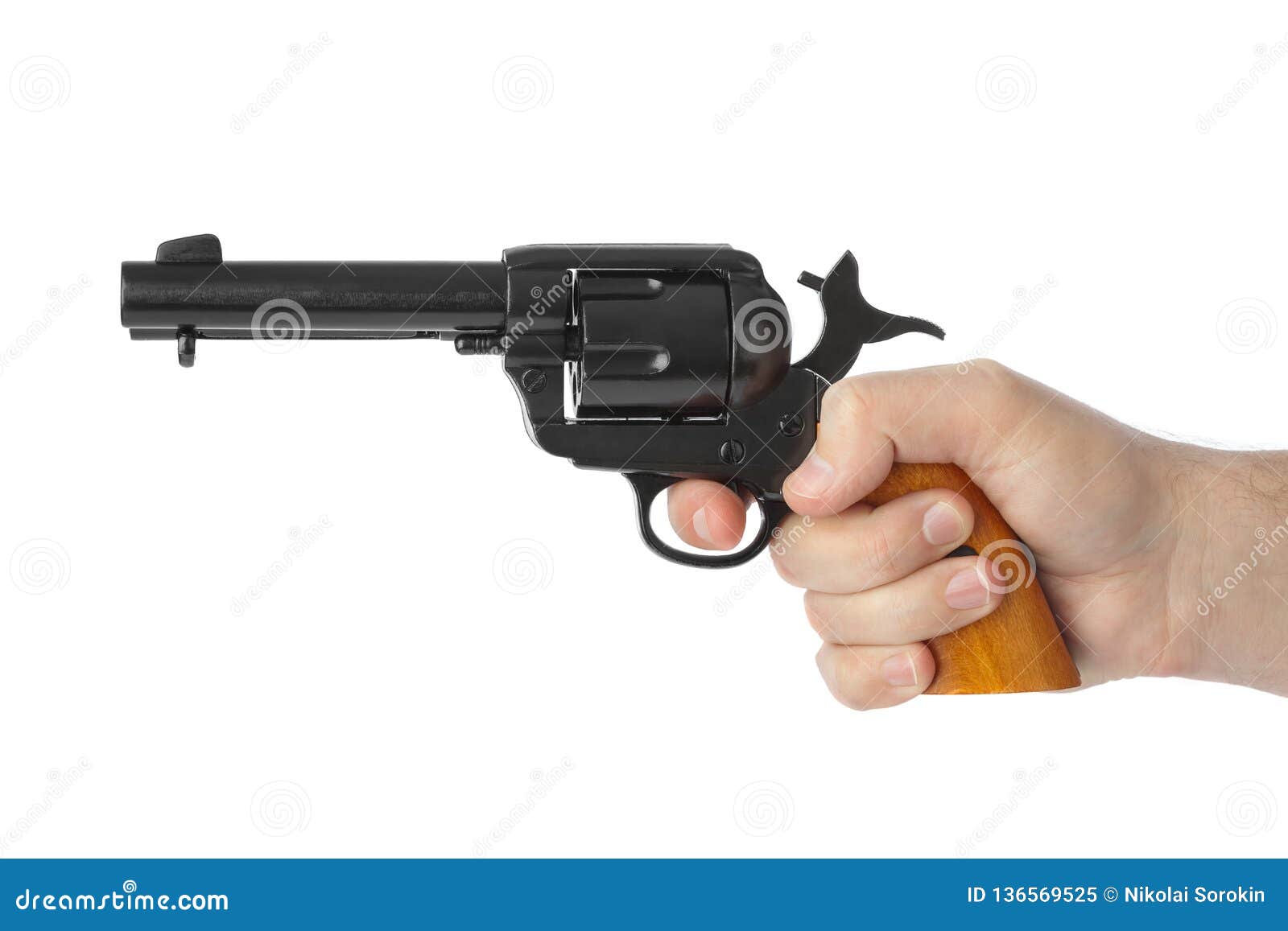 Main avec le revolver image stock. Image du fond, danger - 136569525