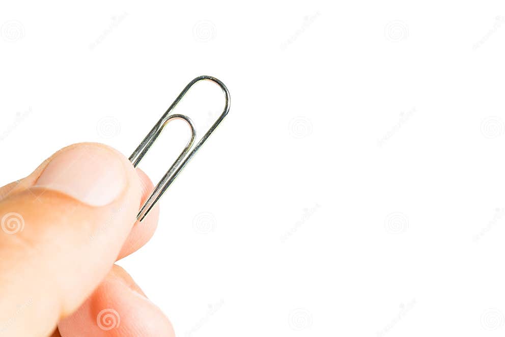 Main avec une agrafe image stock. Image du métal, repli - 33327647